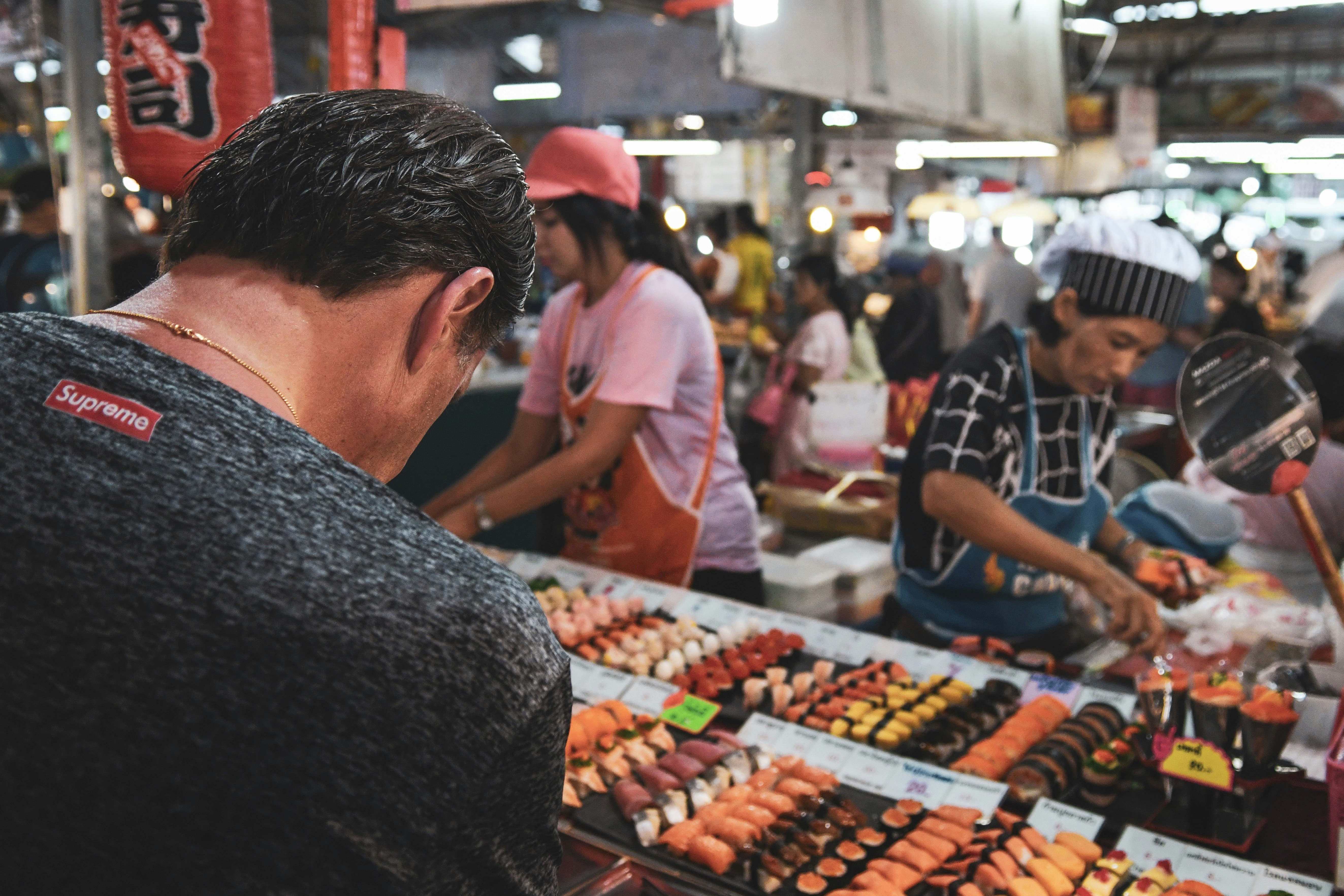 Man selecting food on store photo – Free Phuket Image on Unsplash
