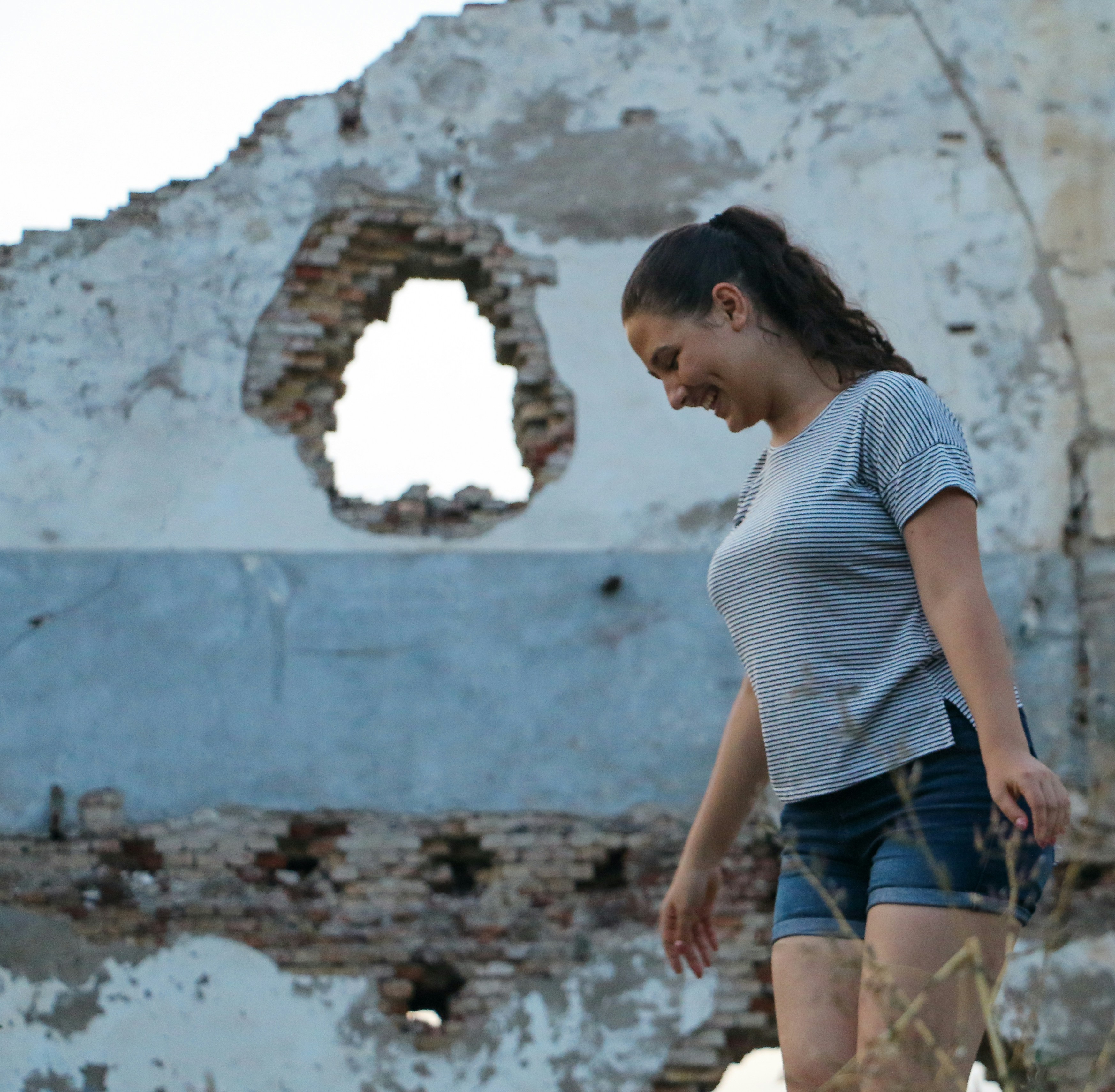 unknown person standing outdoors