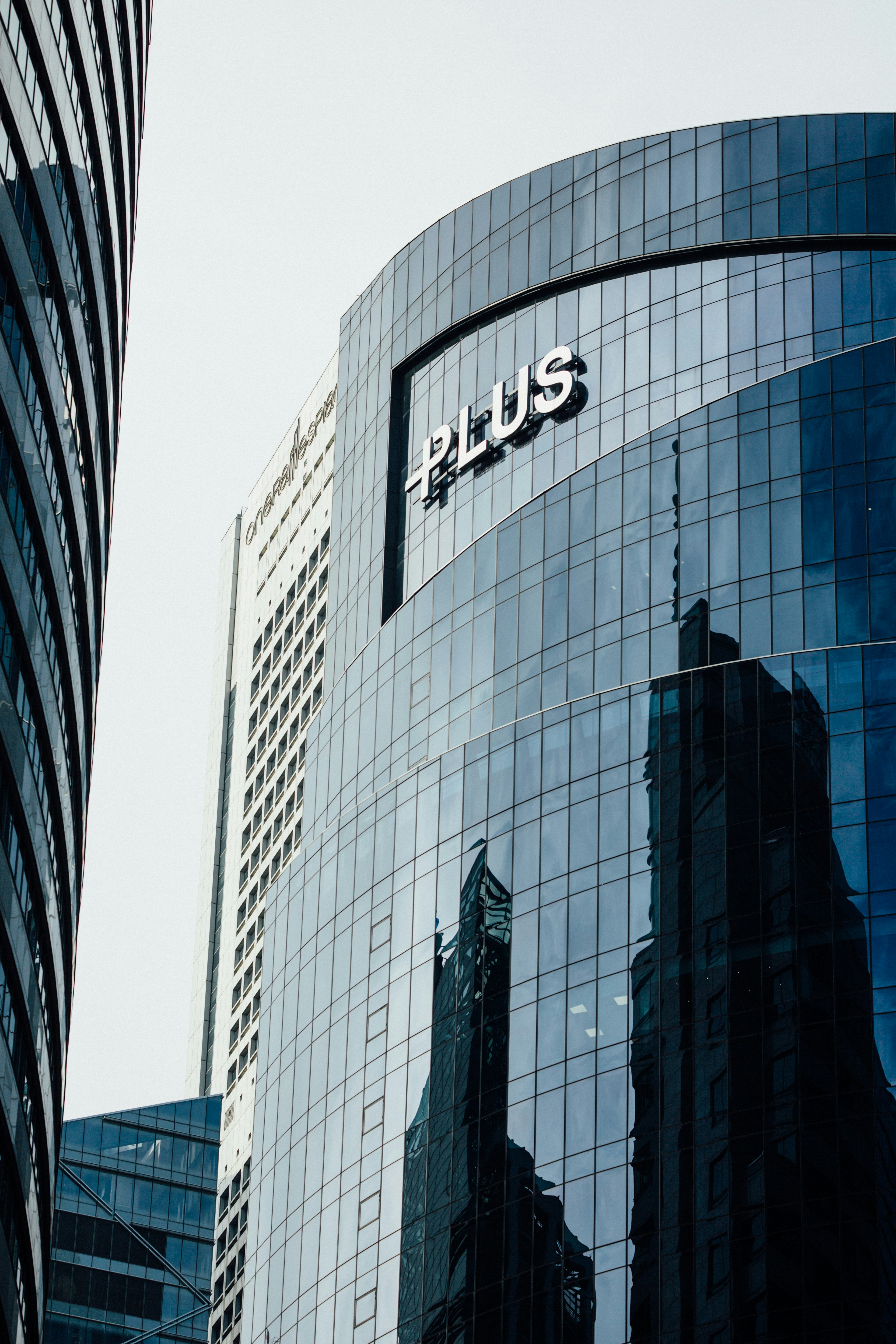 Blue Plus glass building photo – Free Building Image on Unsplash