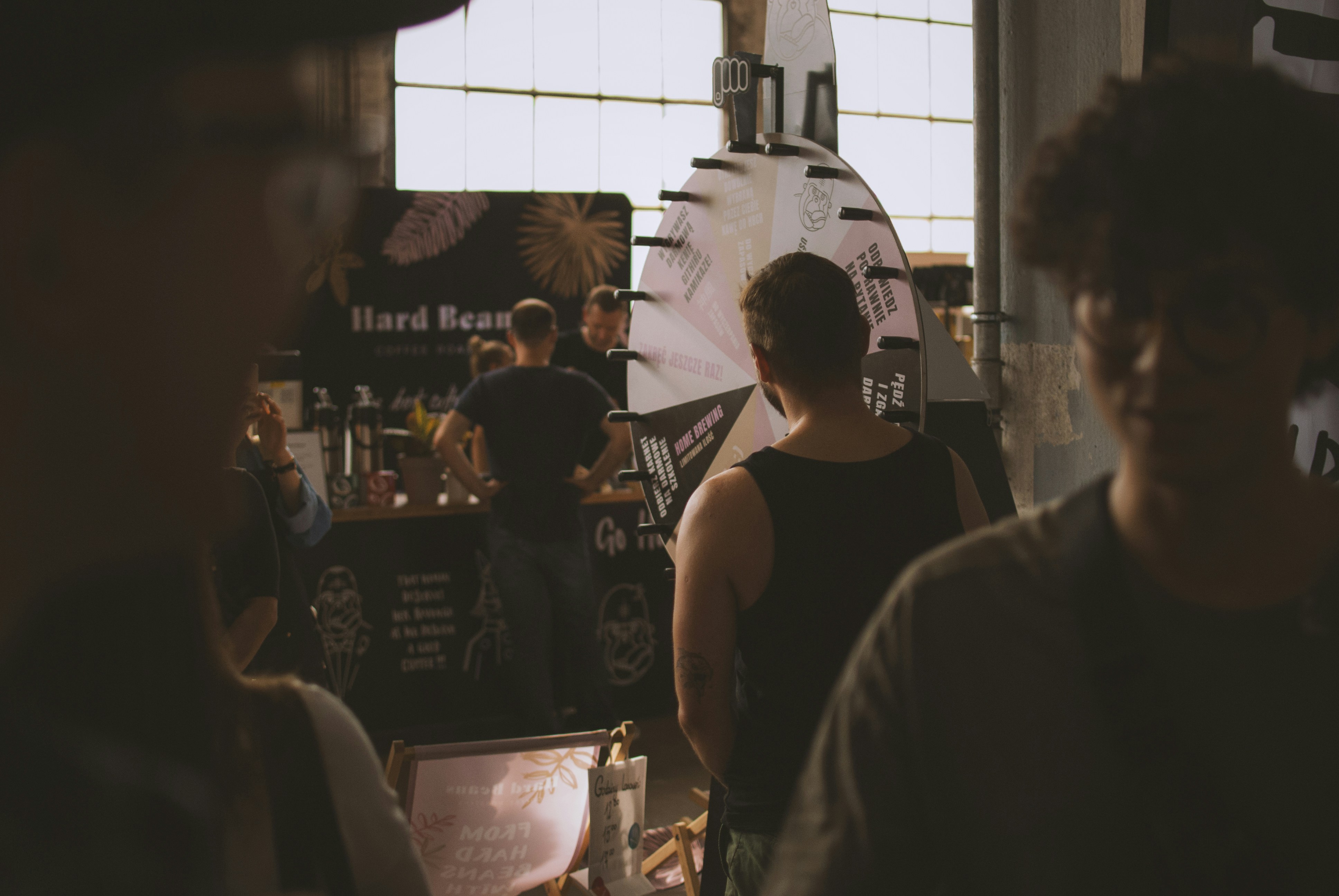 Man standing near spinning wheel photo – Free Competition Image on Unsplash