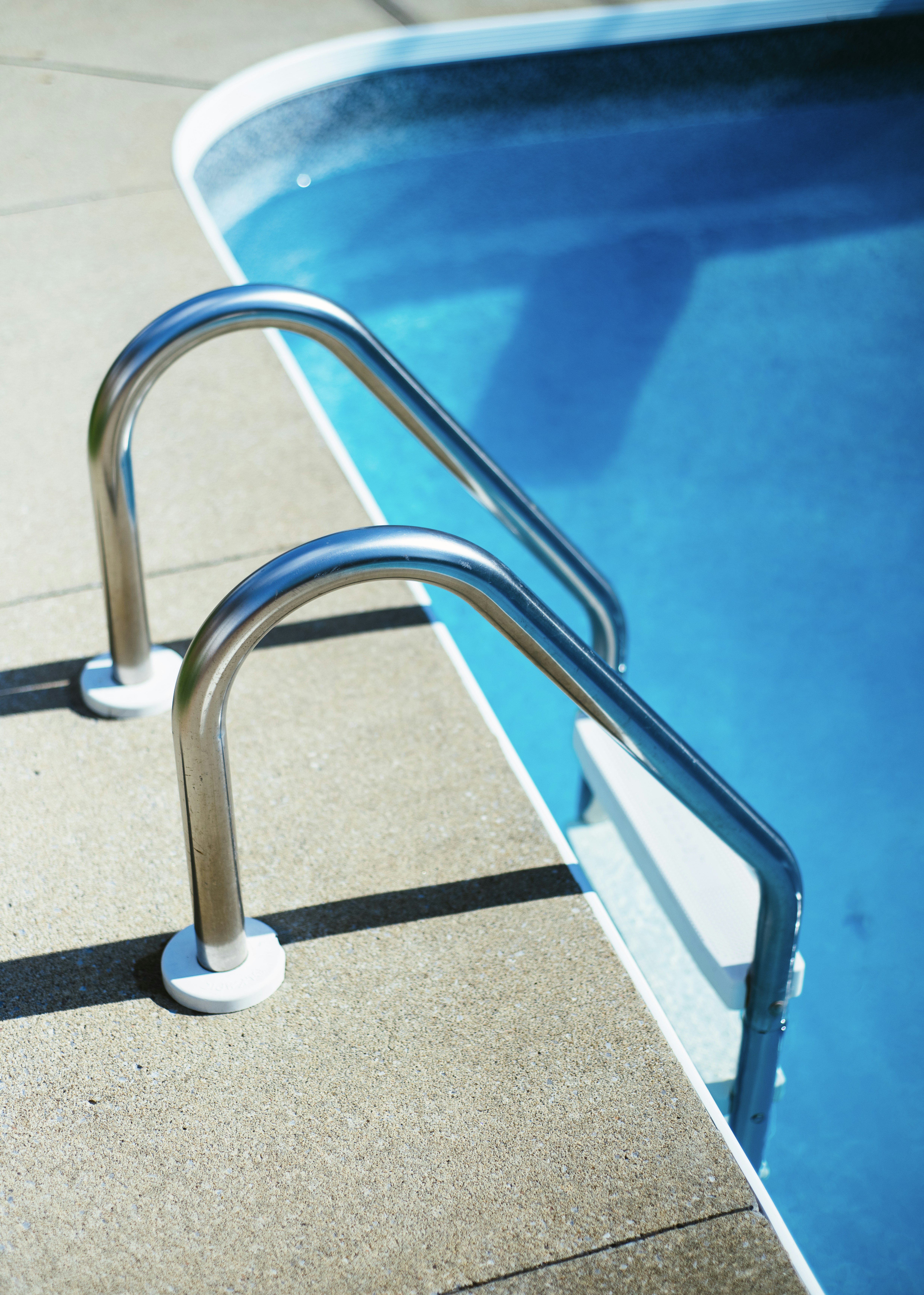 Grey and white pool ladder photo – Free Pool Image on Unsplash