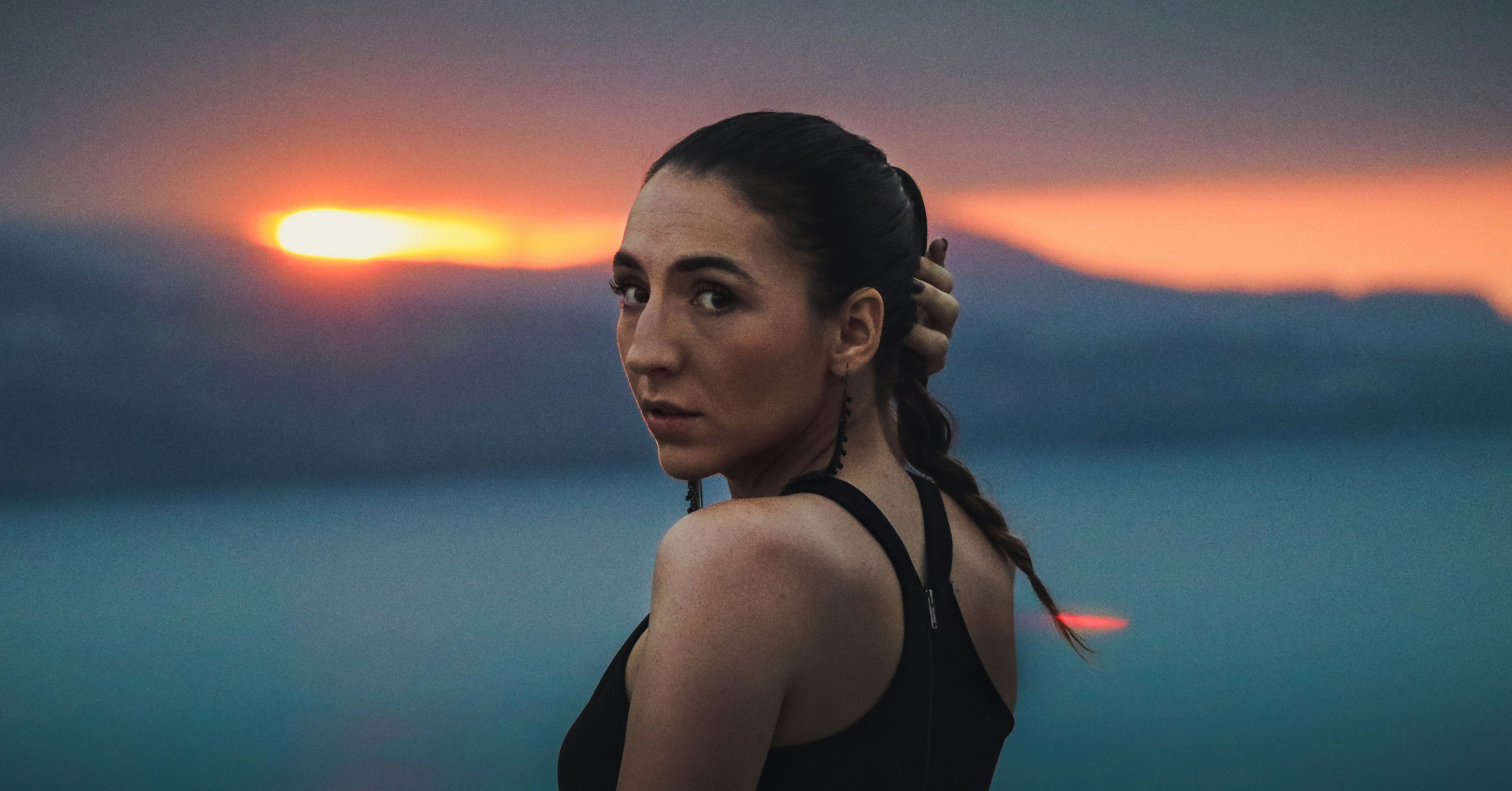 Woman Looking Over Left Shoulder