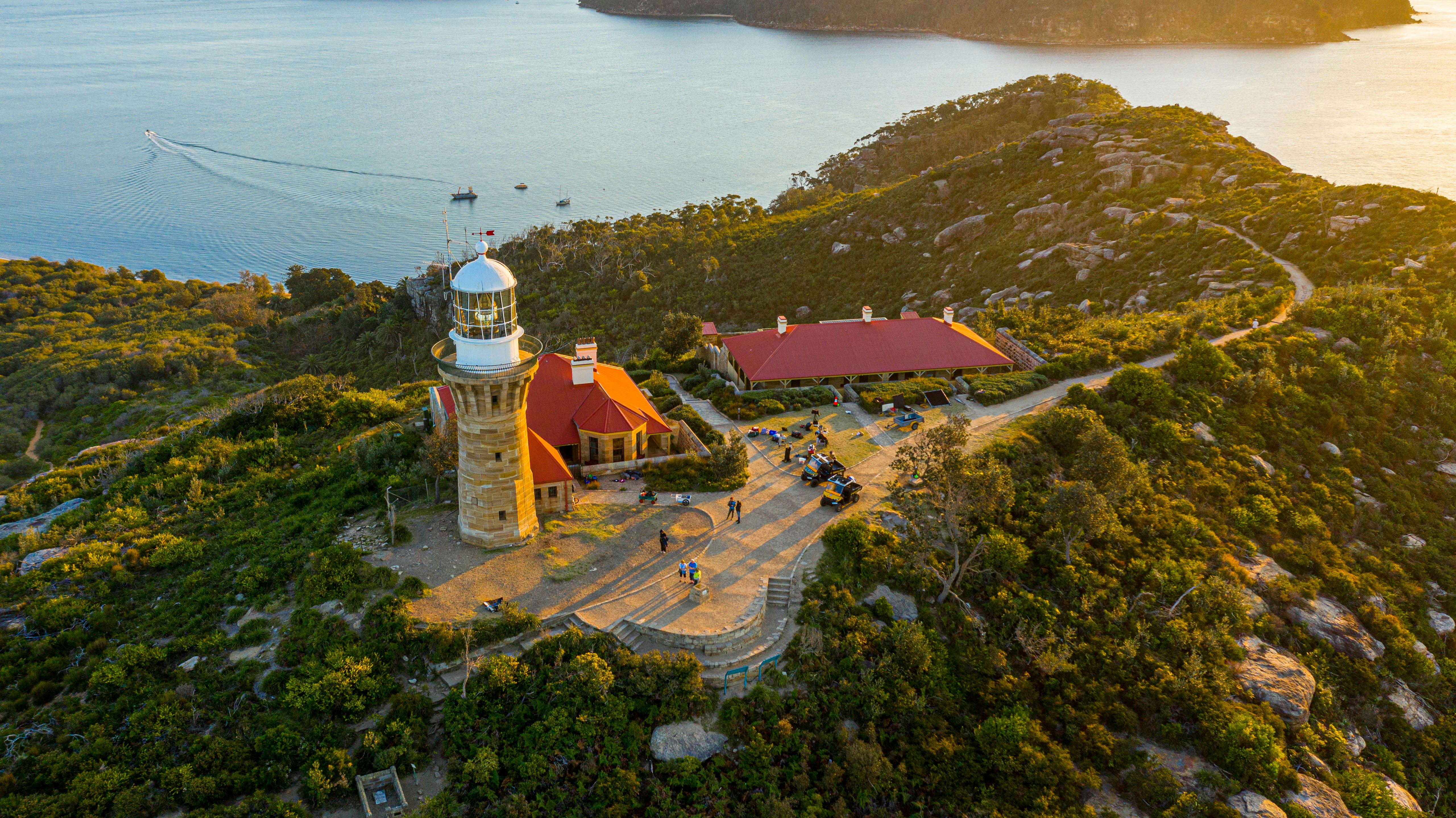 Lighthouse near house photo – Free Nature Image on Unsplash