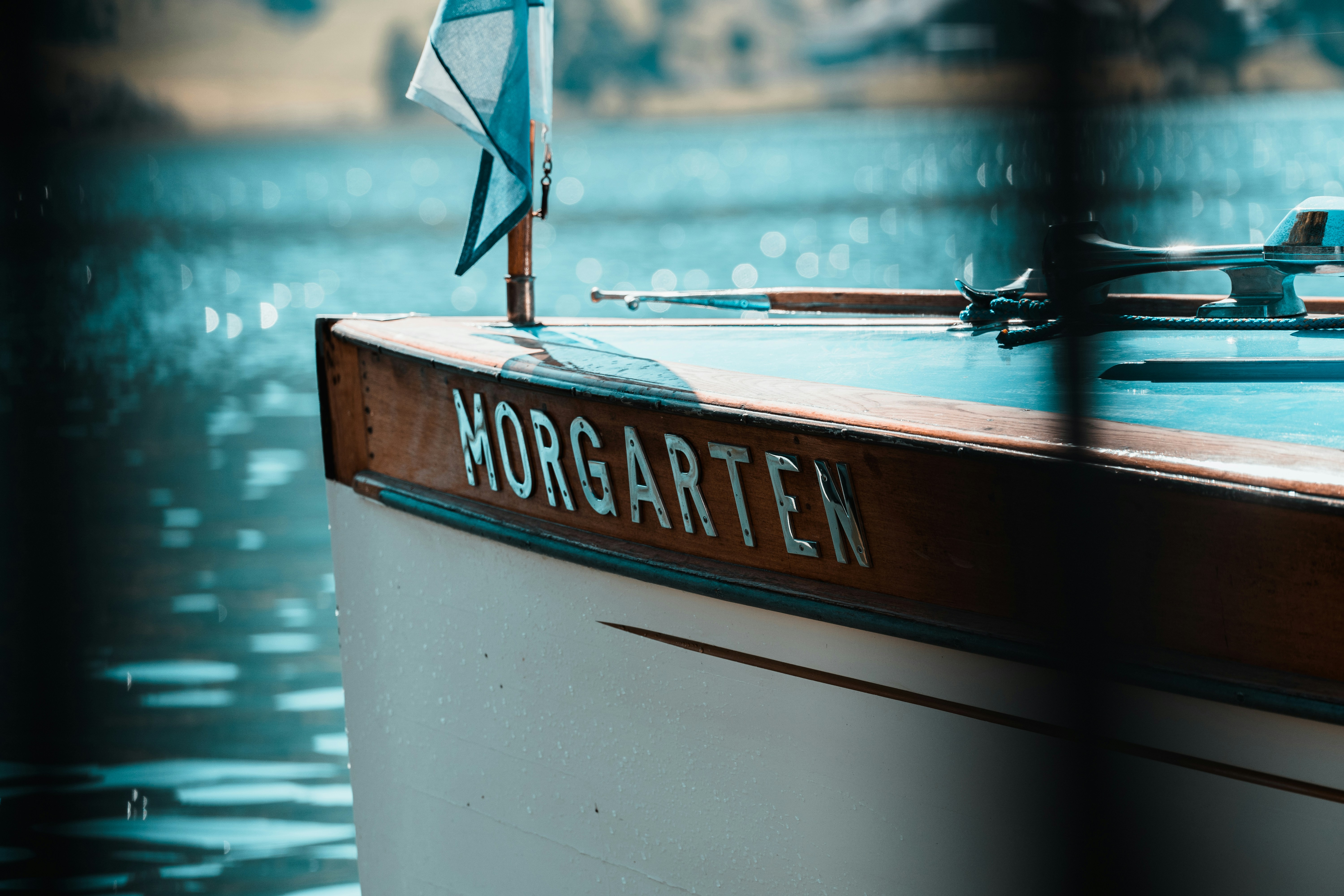 MORGARTEN: Quiet Harbor Hull and Teal Reflections