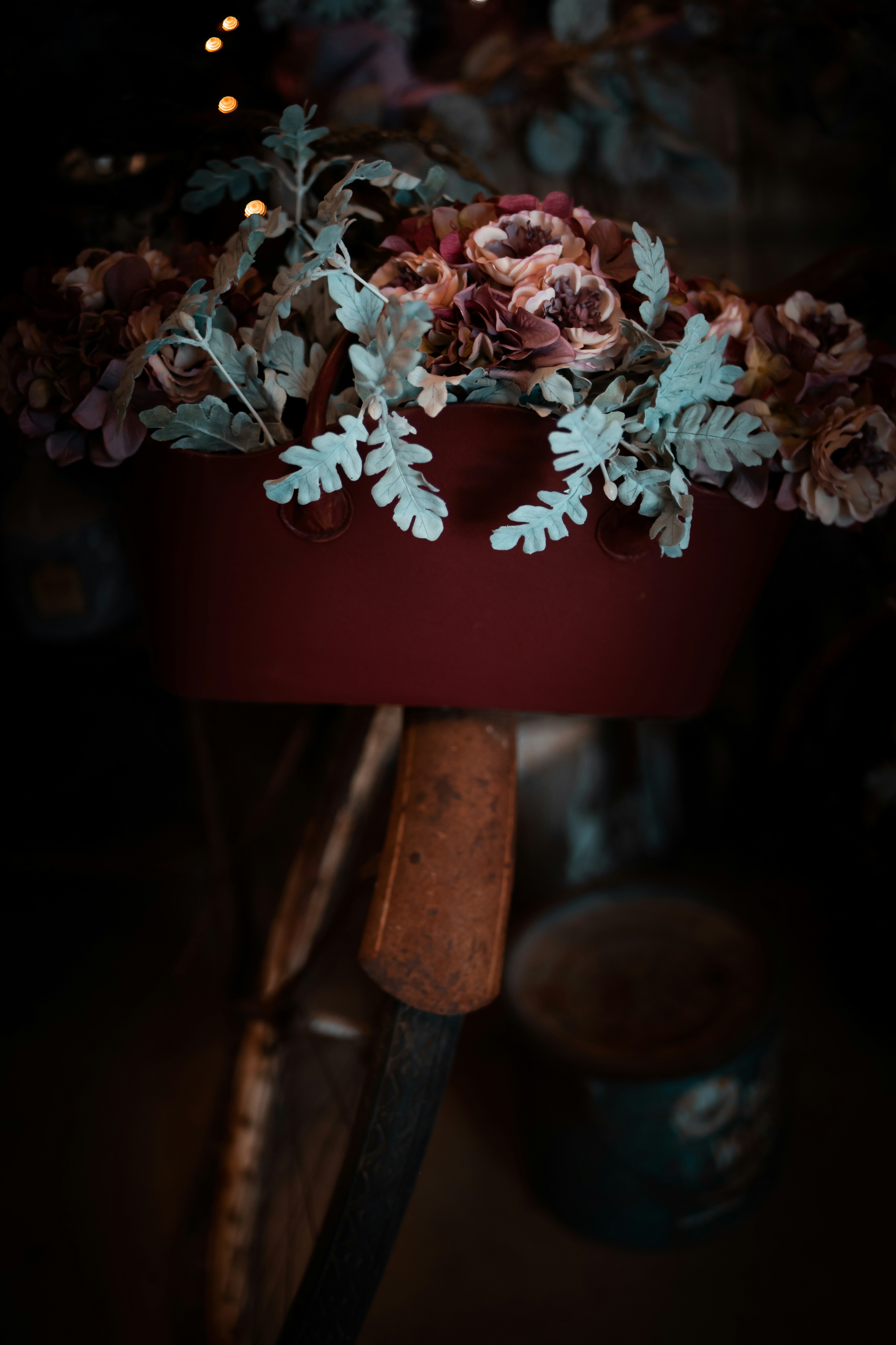 Florals in a Rusted Basket: Quiet Still Life with Faded Color