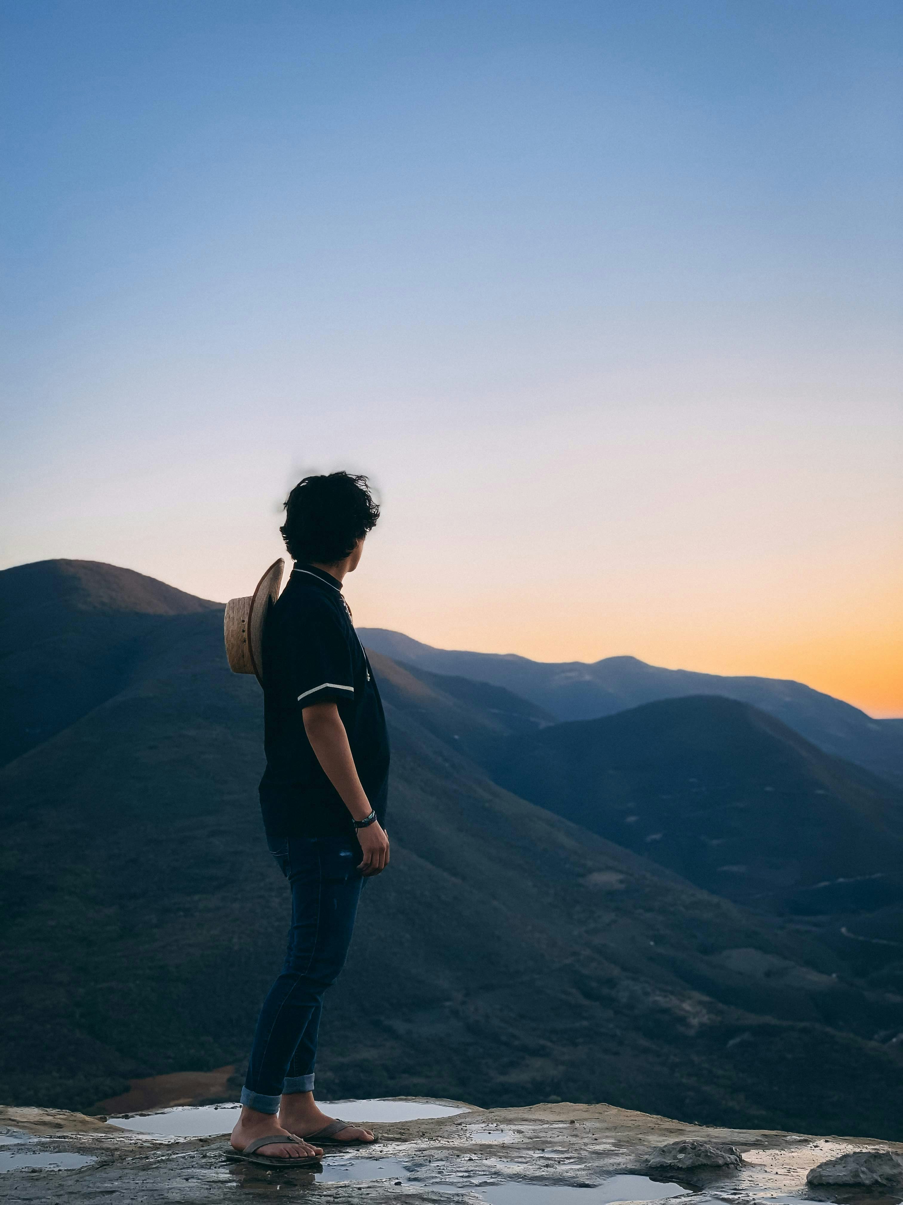 Standing On A Mountain Pictures | Download Free Images on Unsplash