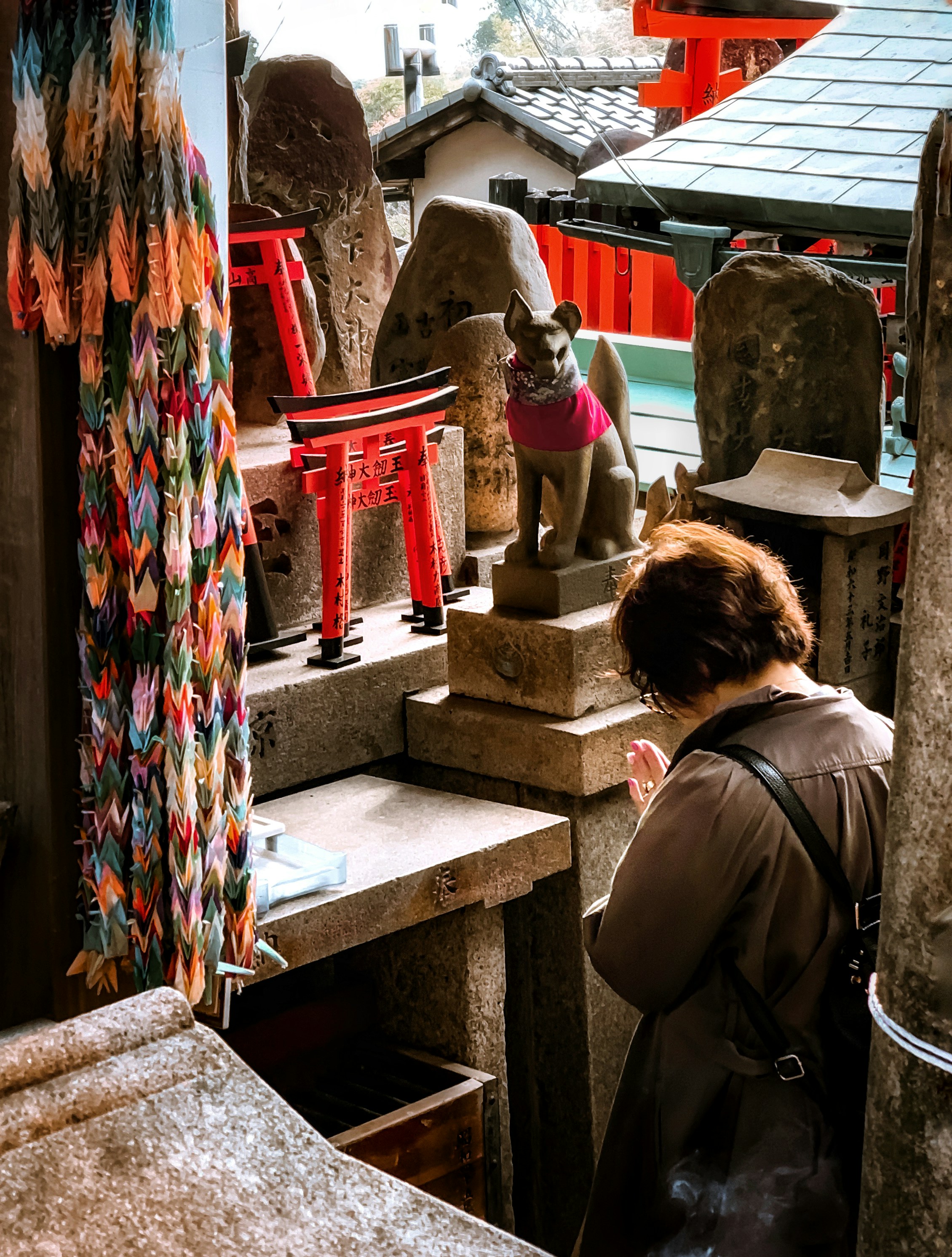 Prayers and Petals at the Shrine: A Woman in Brown in Quiet Contemplation