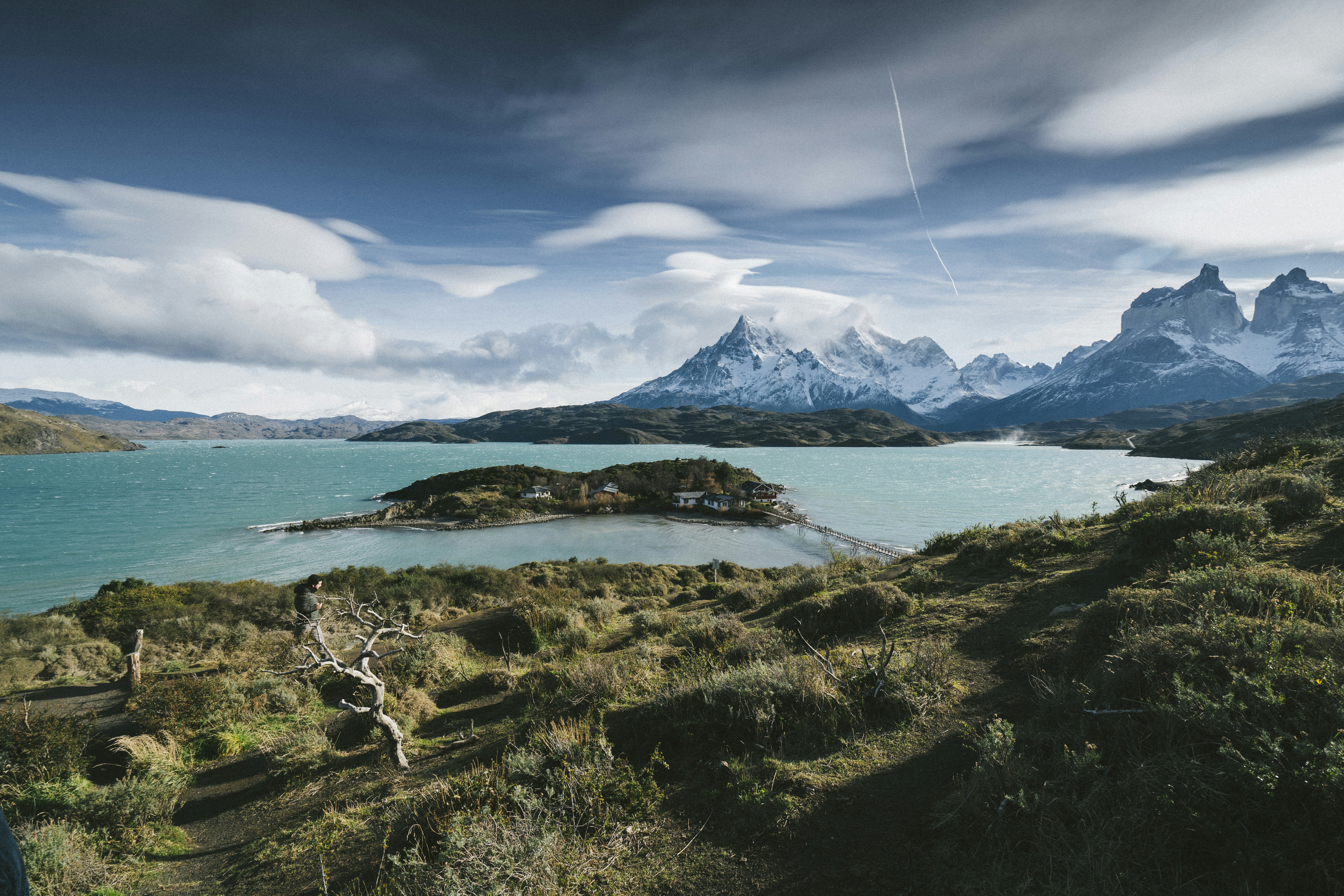 Azure Inlet at the Foot of Jagged Alpine Ridges