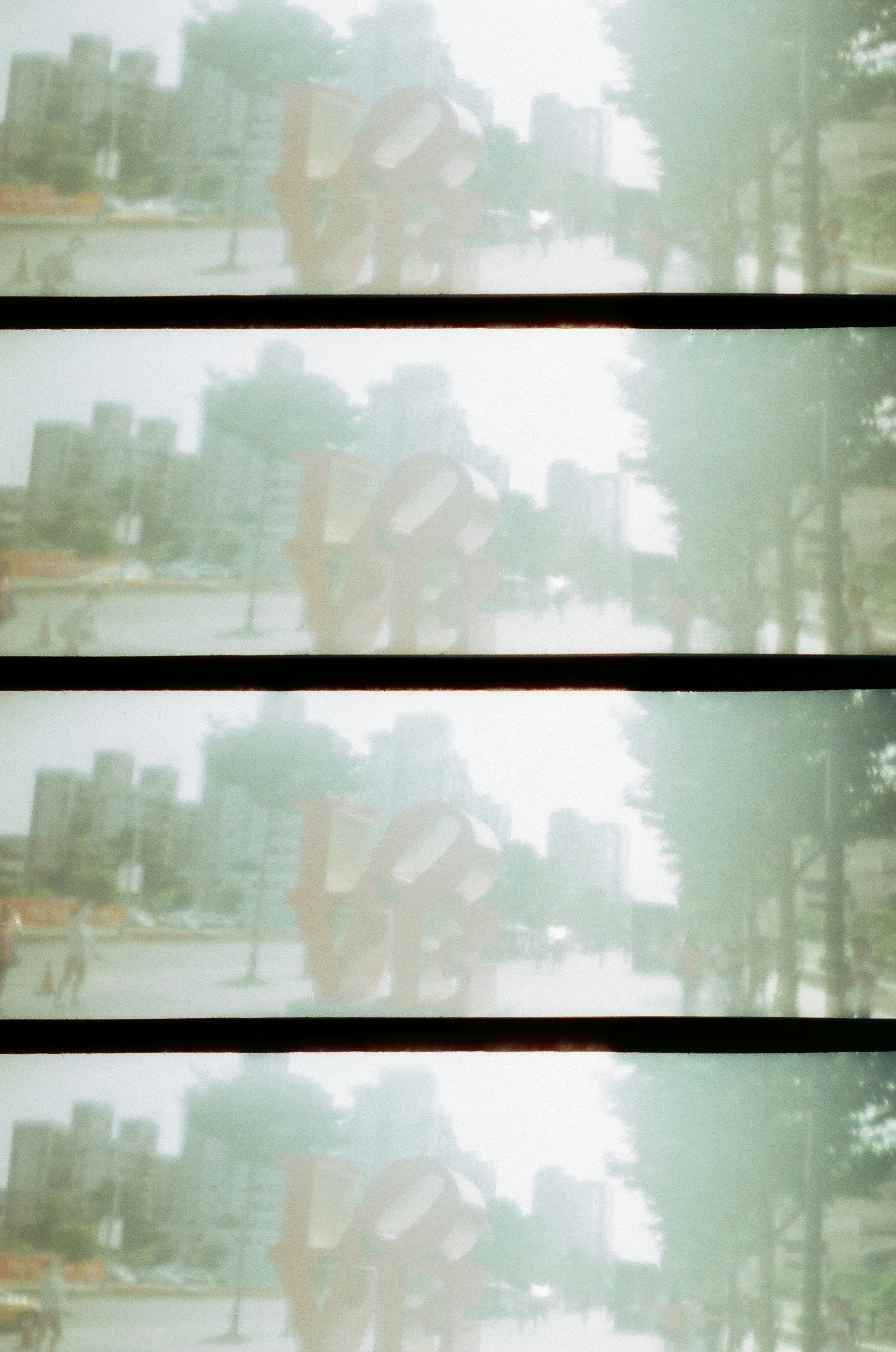 A blurry picture of a stop sign in a city photo – Free Taipei Image on ...