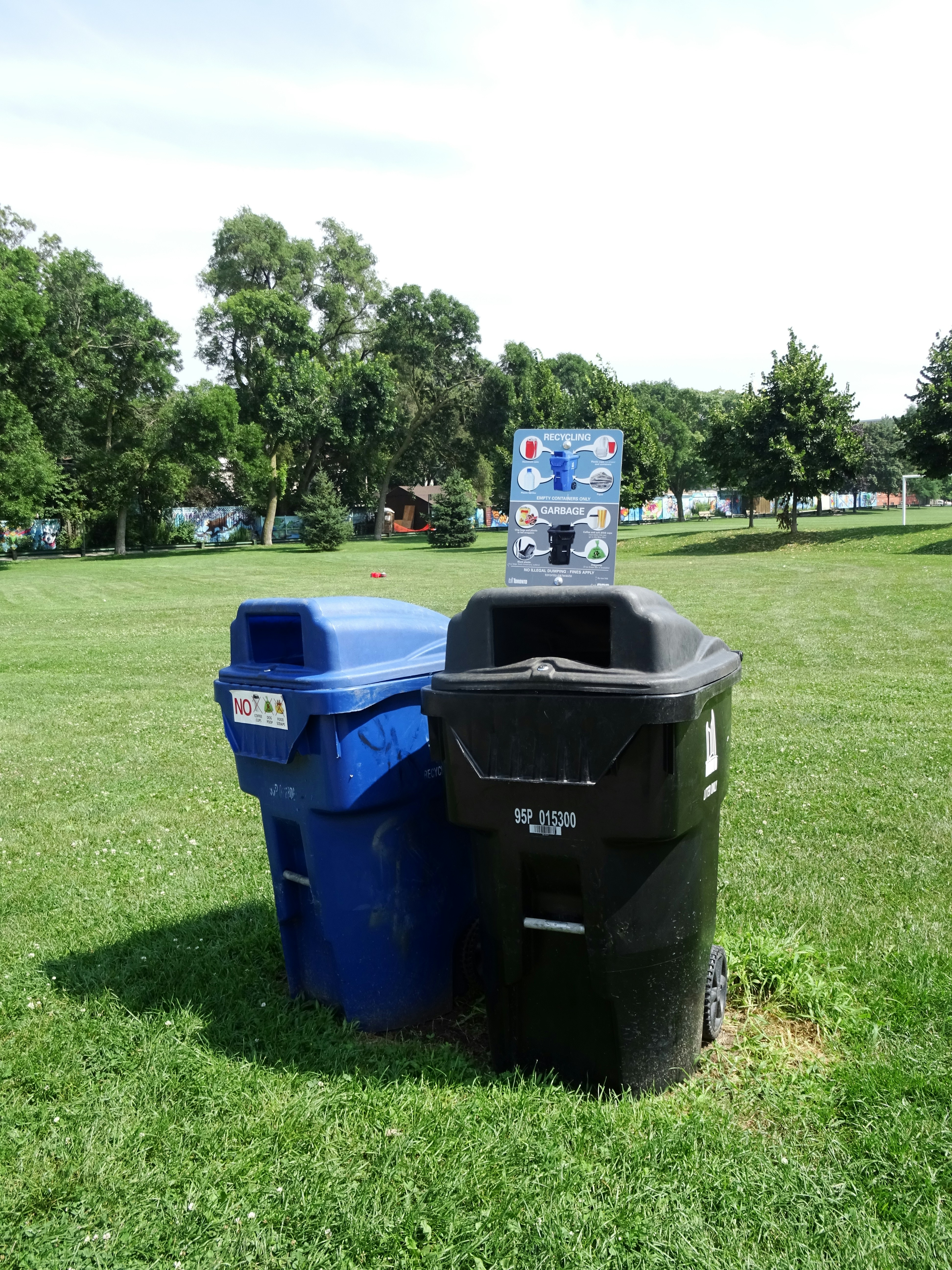 Two black and blue trash cans photo – Free Recycle bin park Image on ...