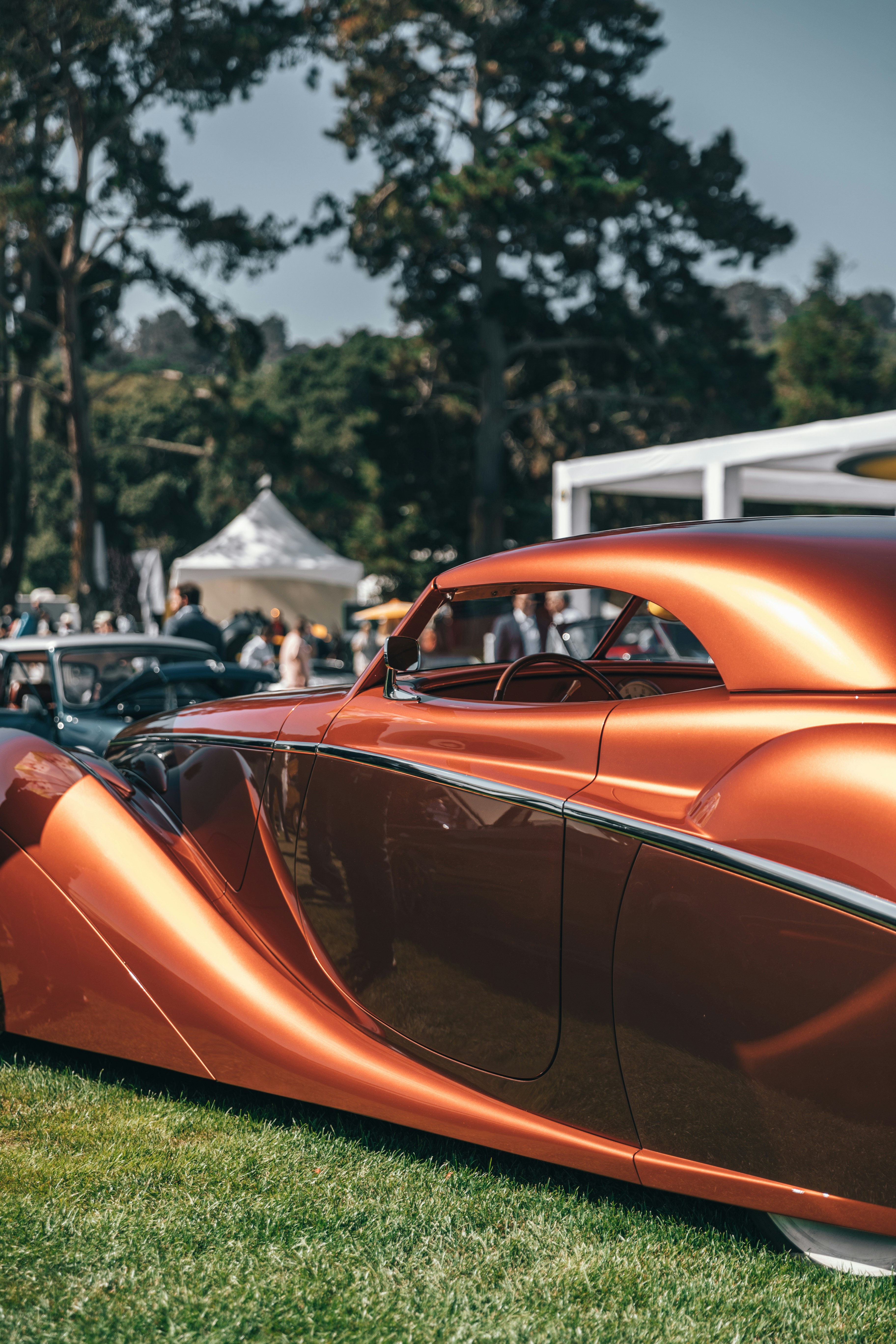 Copper Dream: The Streamlined Chrome of a Classic Convertible