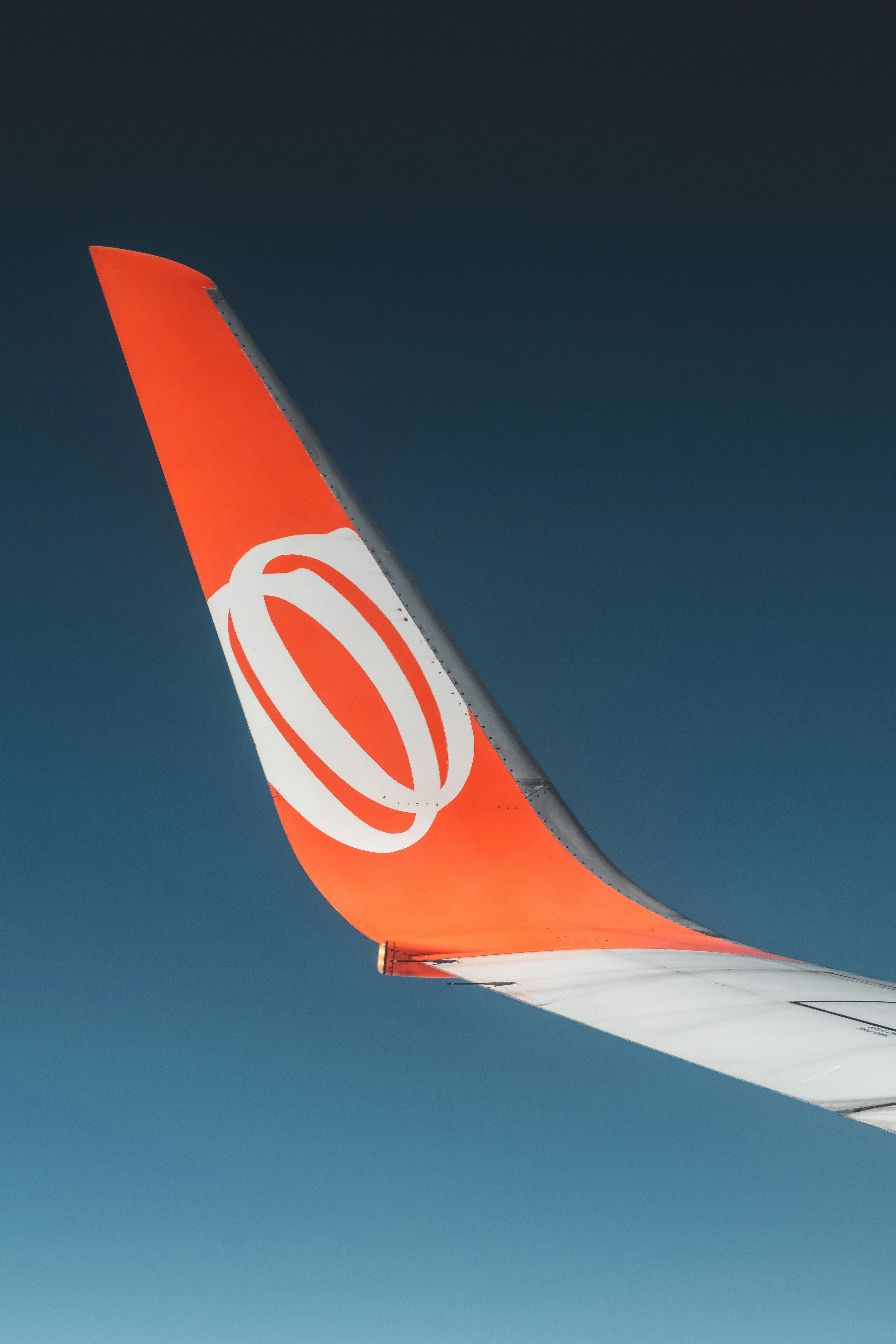 Orange and white airplane wing photo – Free Sky Image on Unsplash