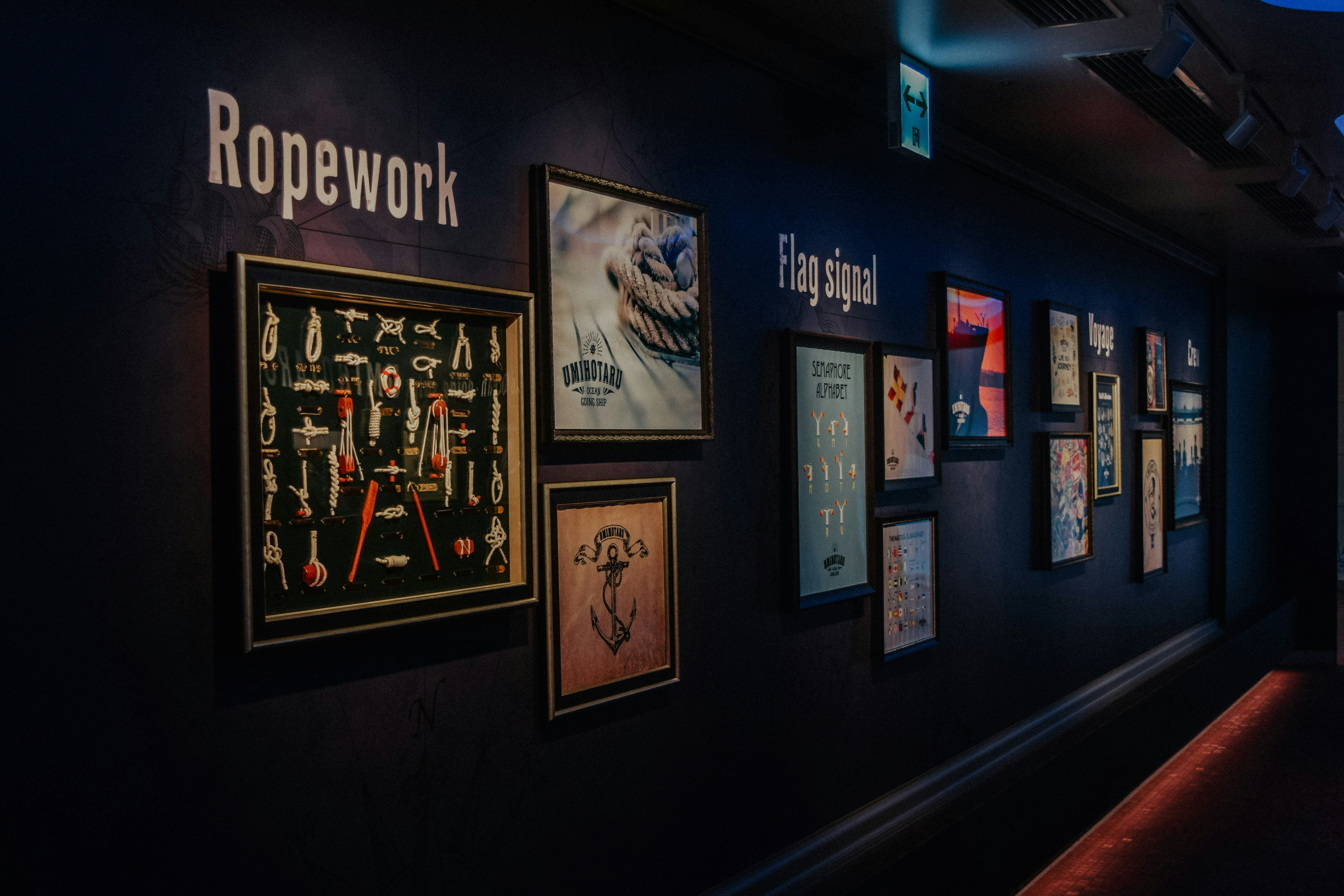 Rope Work and Flag Signal posters on black wall photo – Free Art Image ...