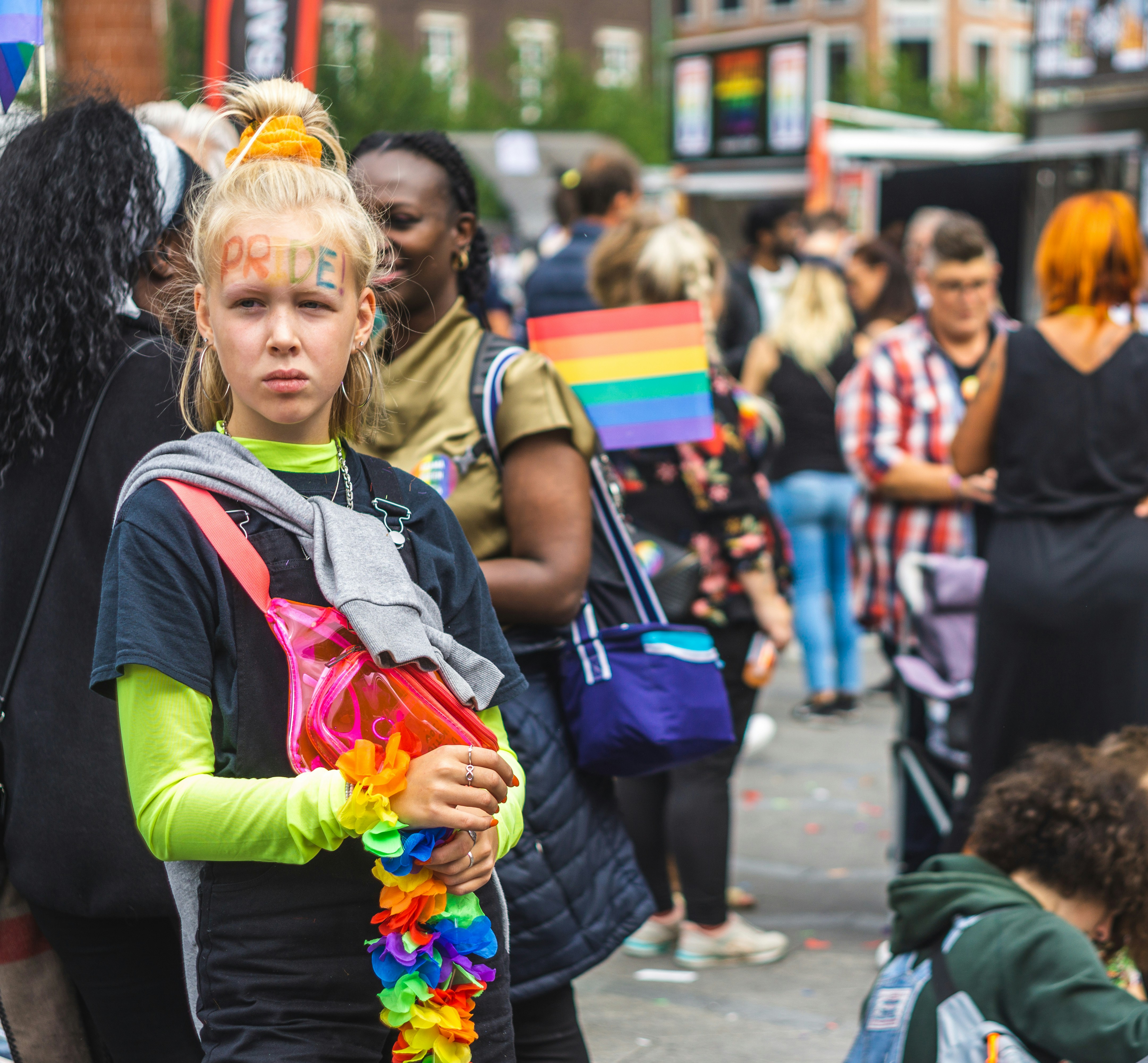 Pride Face: A Girl at the Front of a Rainbow Parade