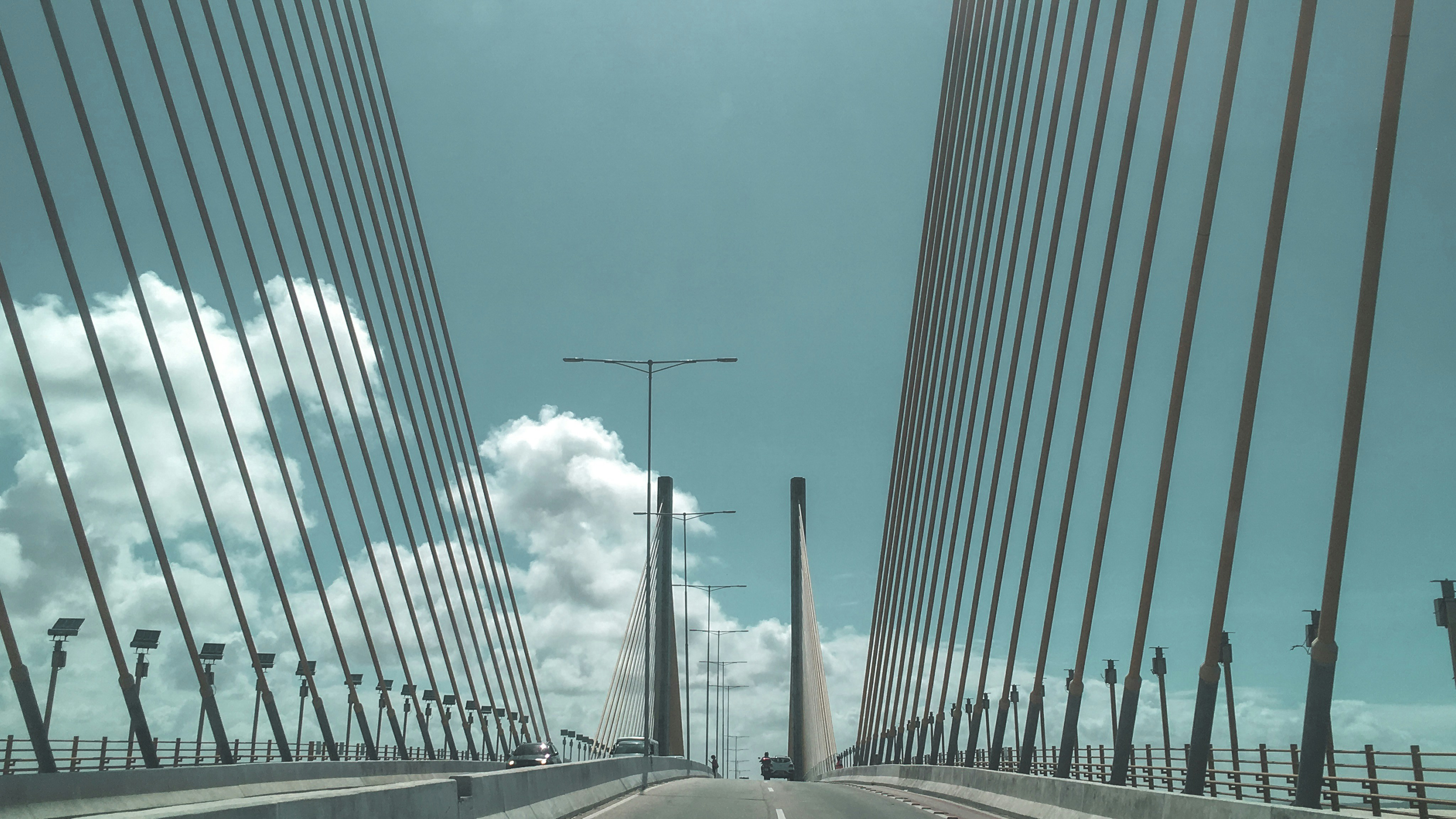 A view of a bridge from the inside of a car photo – Free Building Image ...