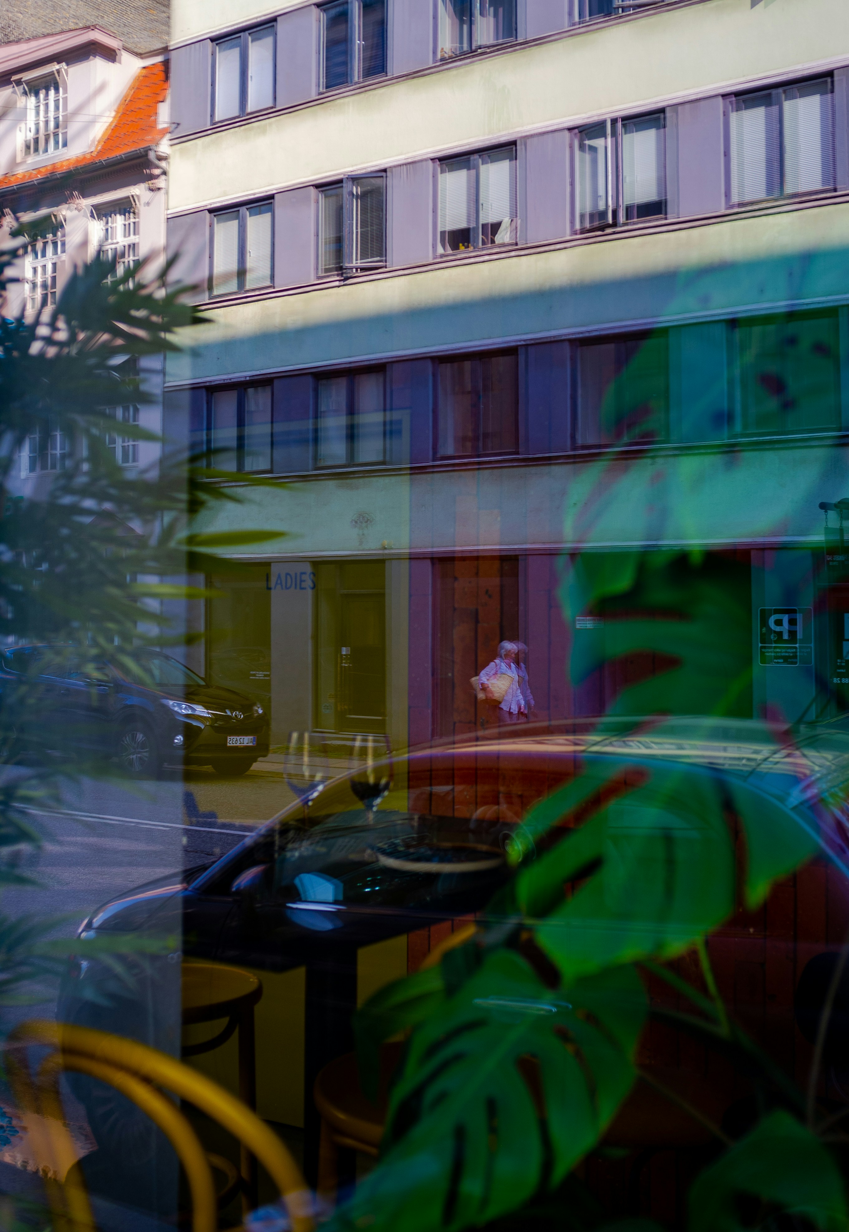 Reflections in a Hidden Café Window