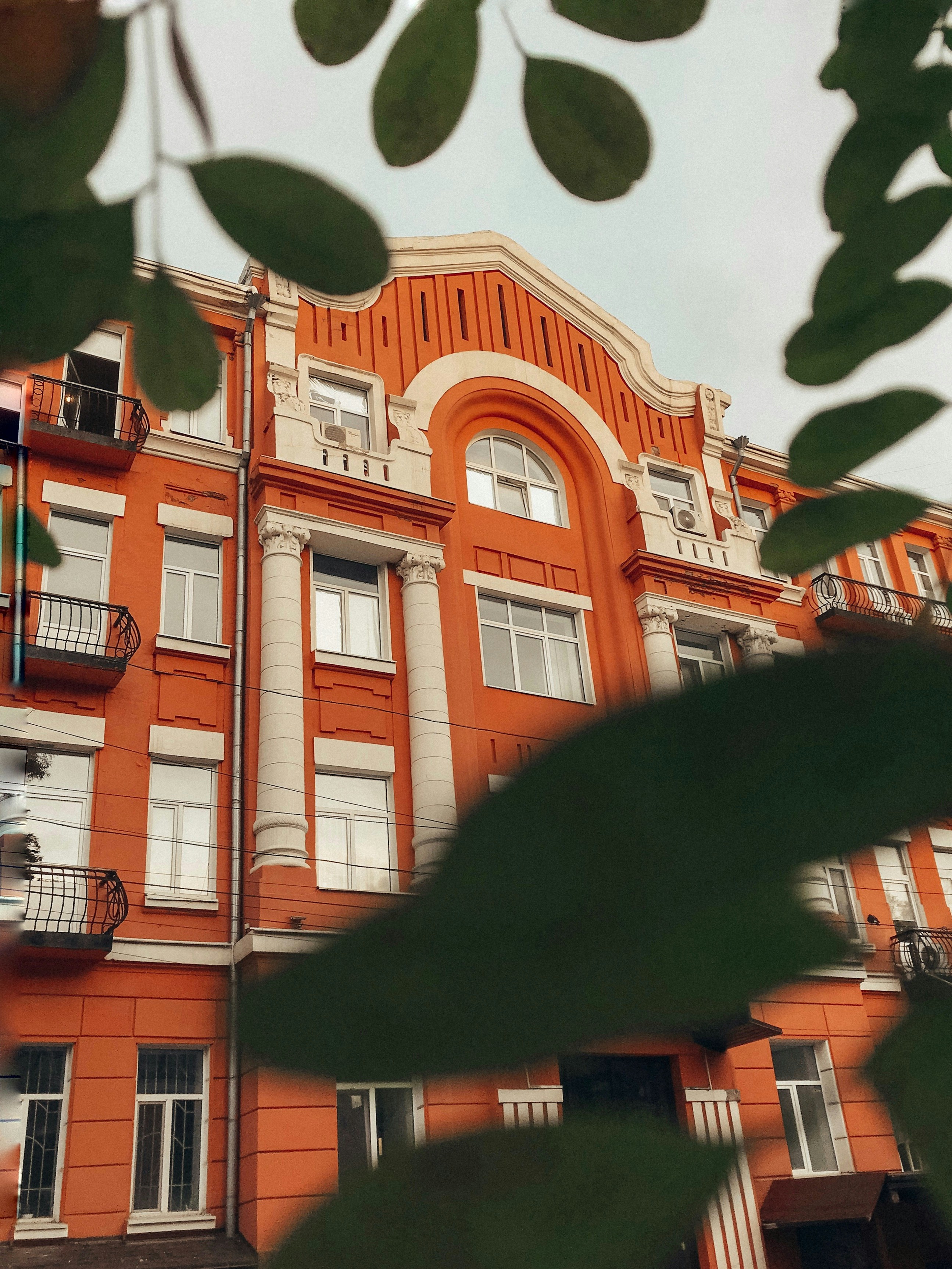 photo of orange and white concrete building
