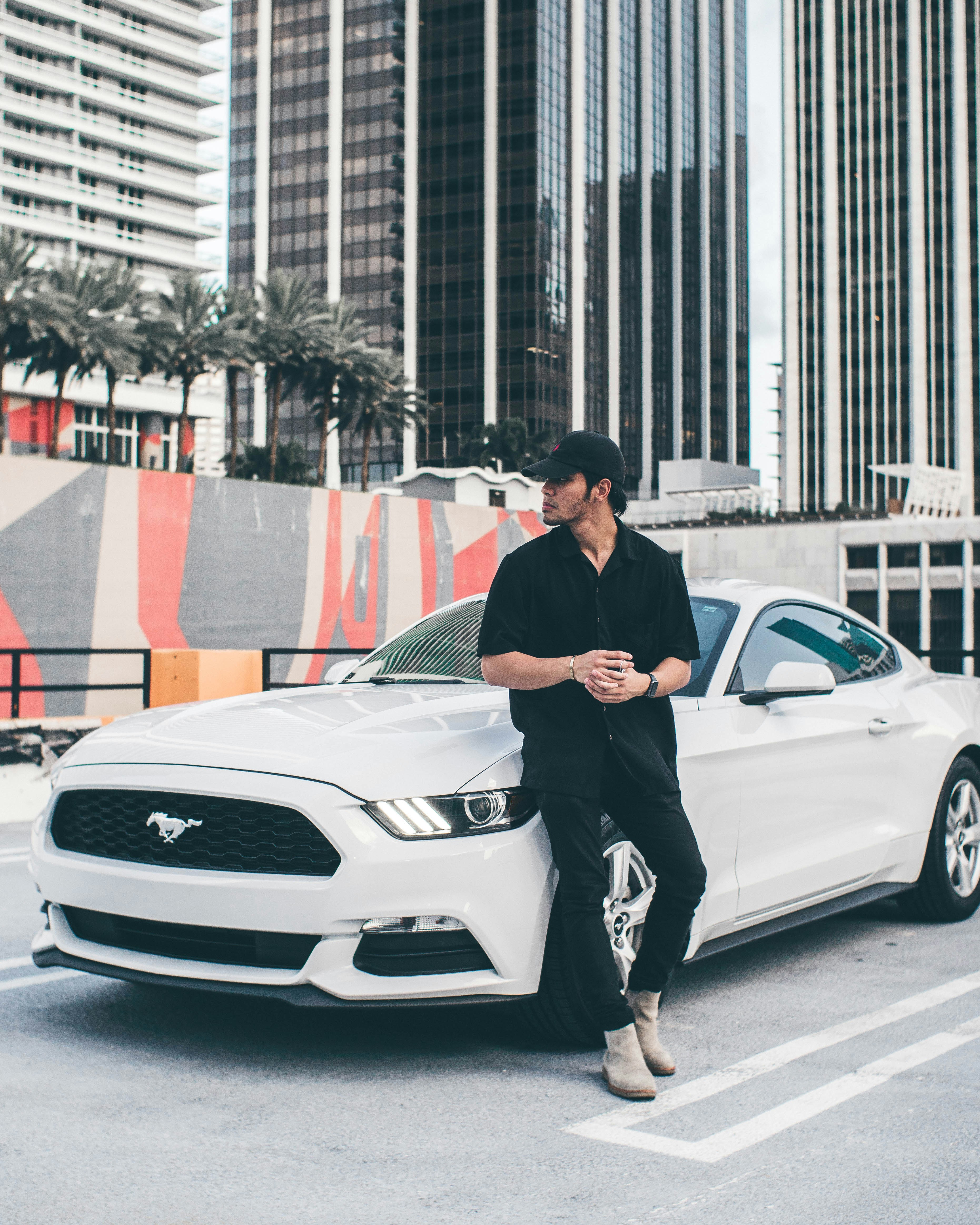 Chrome and Concrete: A Street Portrait by the White Mustang