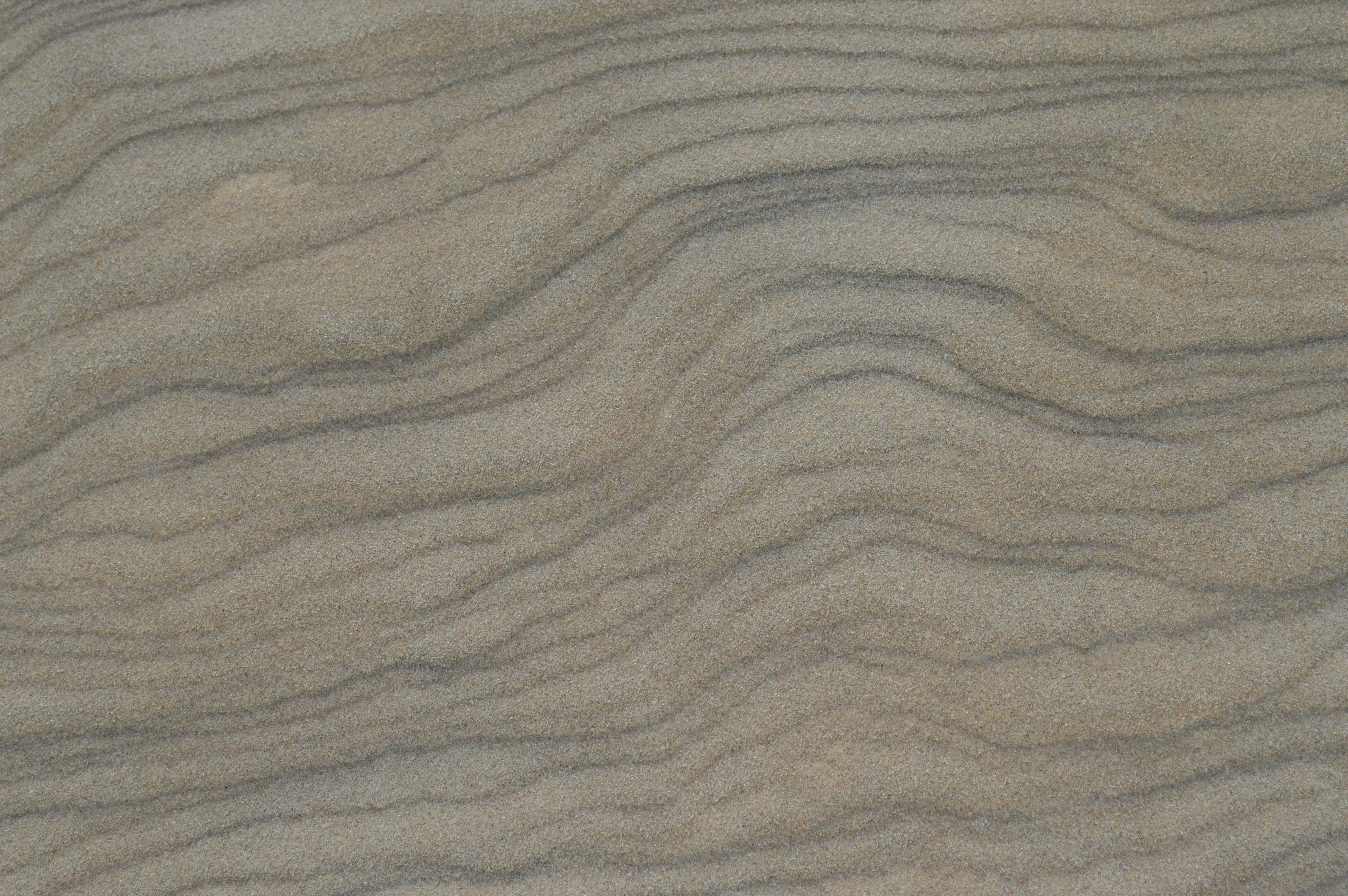 A close up of sand with wavy lines photo – Free Grey Image on Unsplash