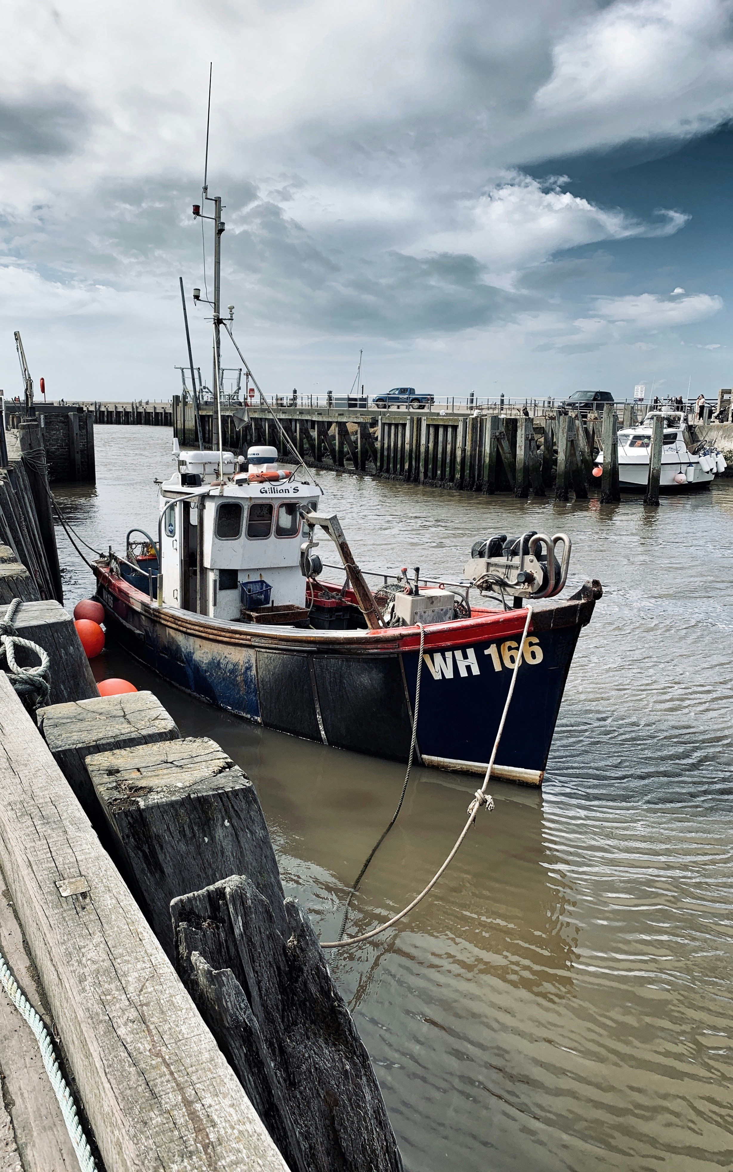  Harbor Tug at Weathered Wharf with Seaborn Sky