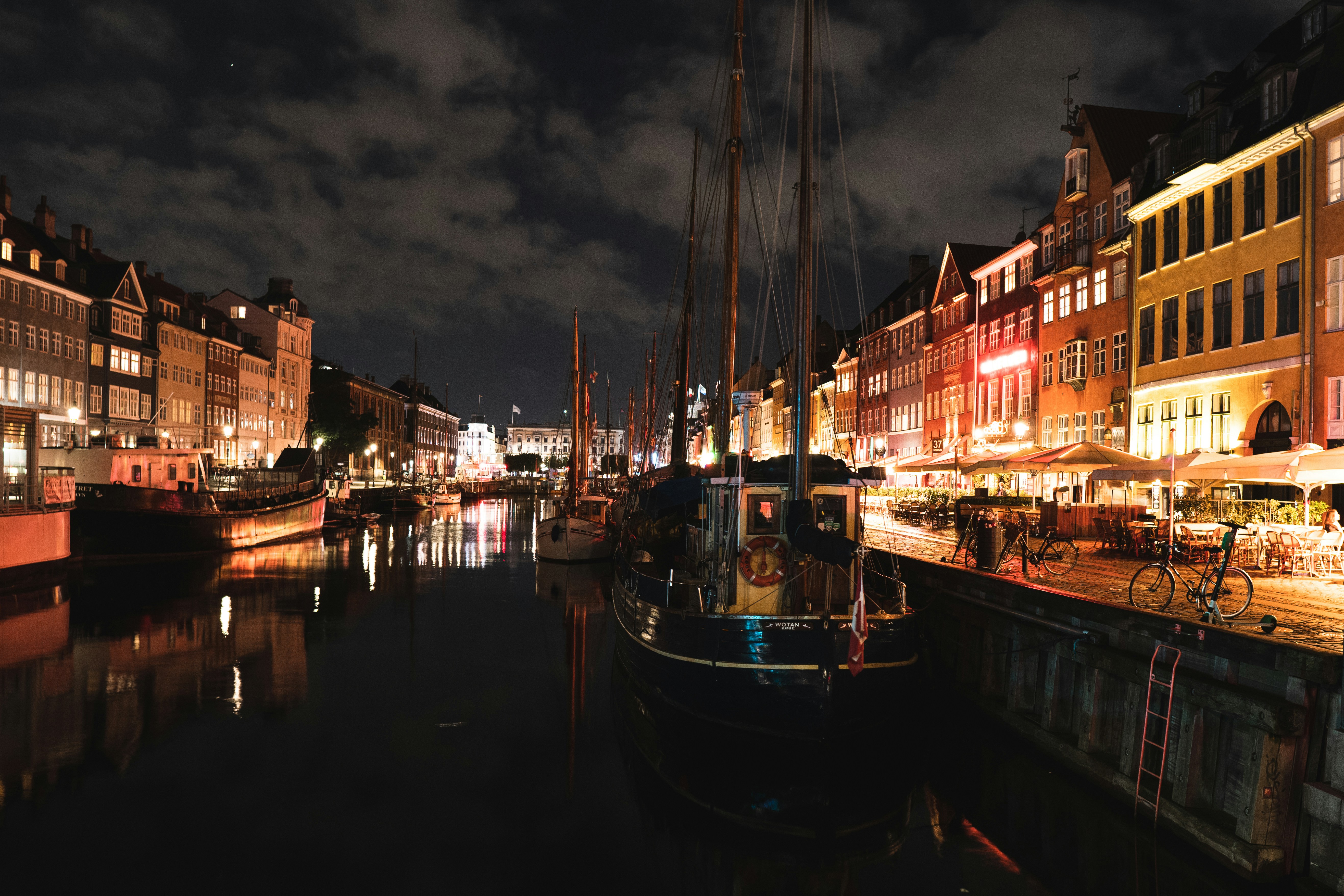 Parked boat beside dock photo – Free Nyhavn Image on Unsplash