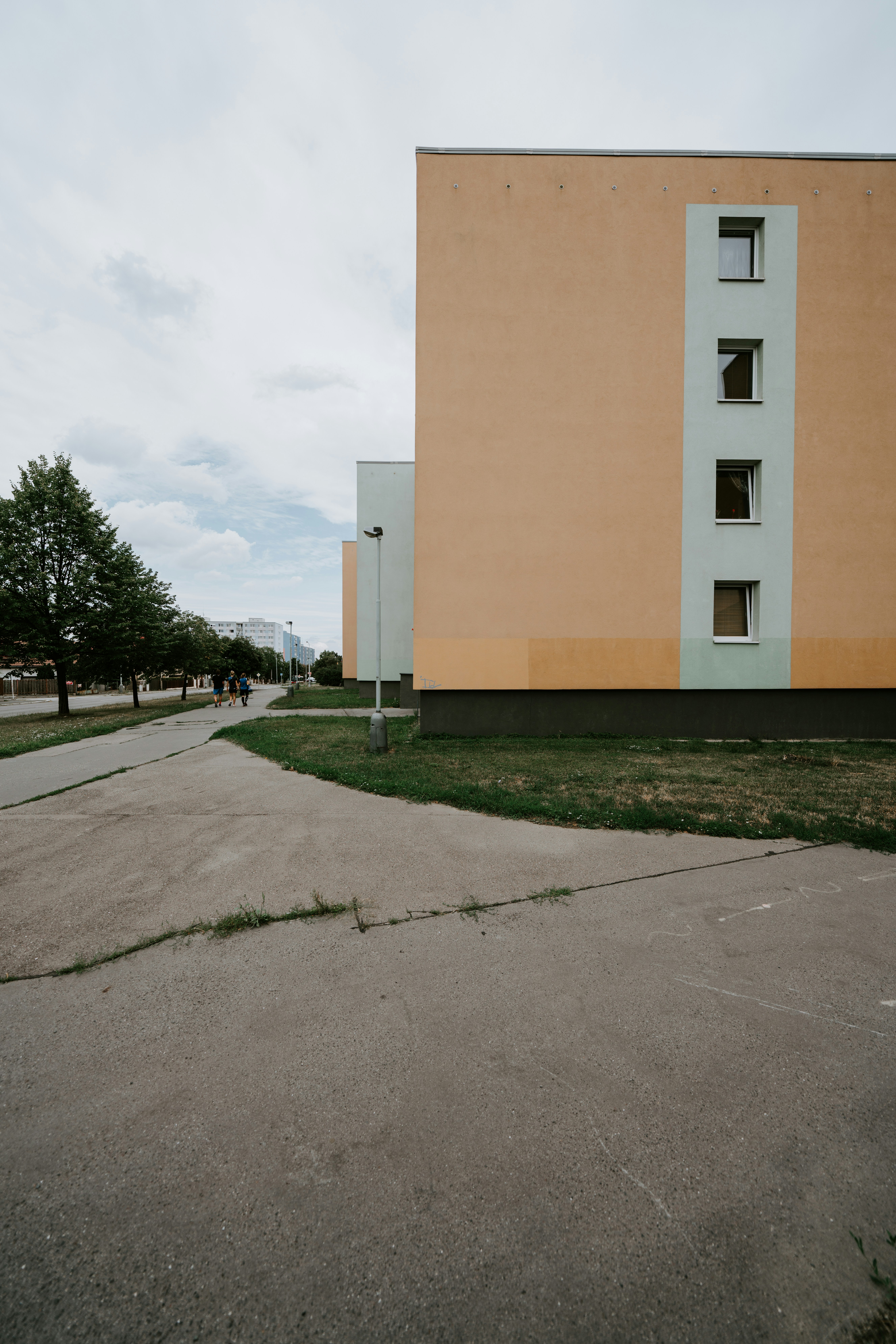 Pastel Facade at the Edge of Quiet Street