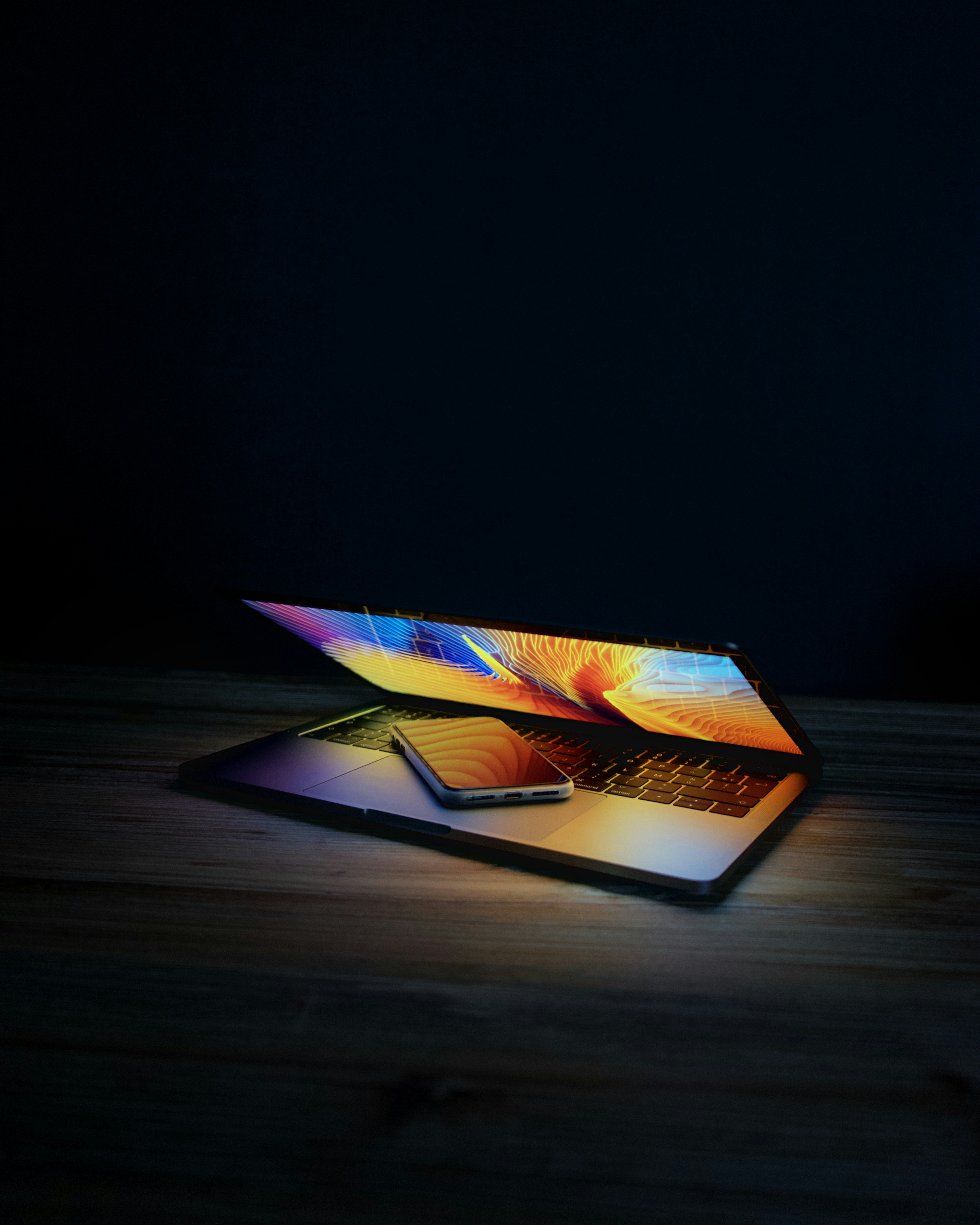 IPhone on MacBook Pro photo – Free Business Image on Unsplash