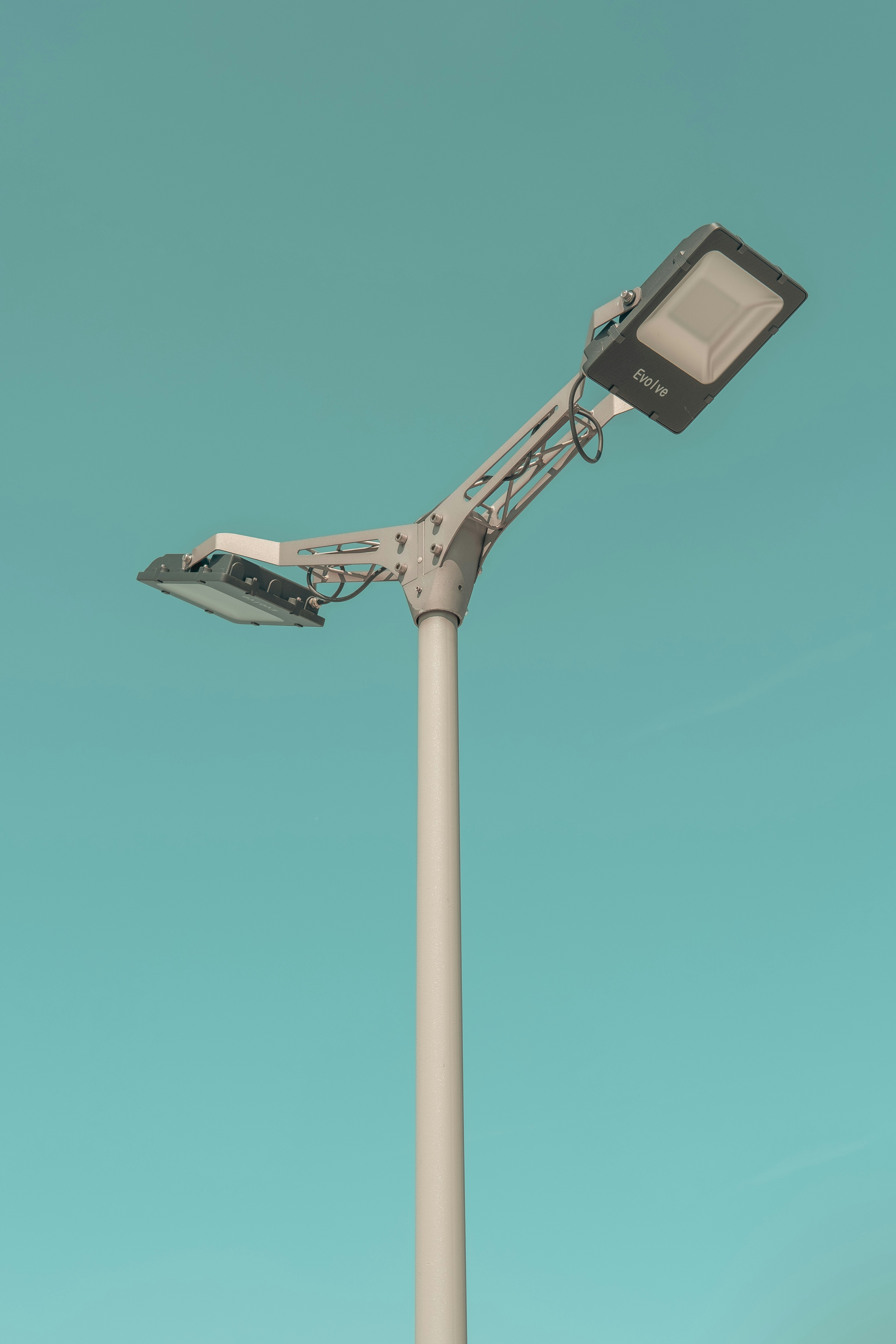 White street lights at daytime photo – Free Lamp Image on Unsplash