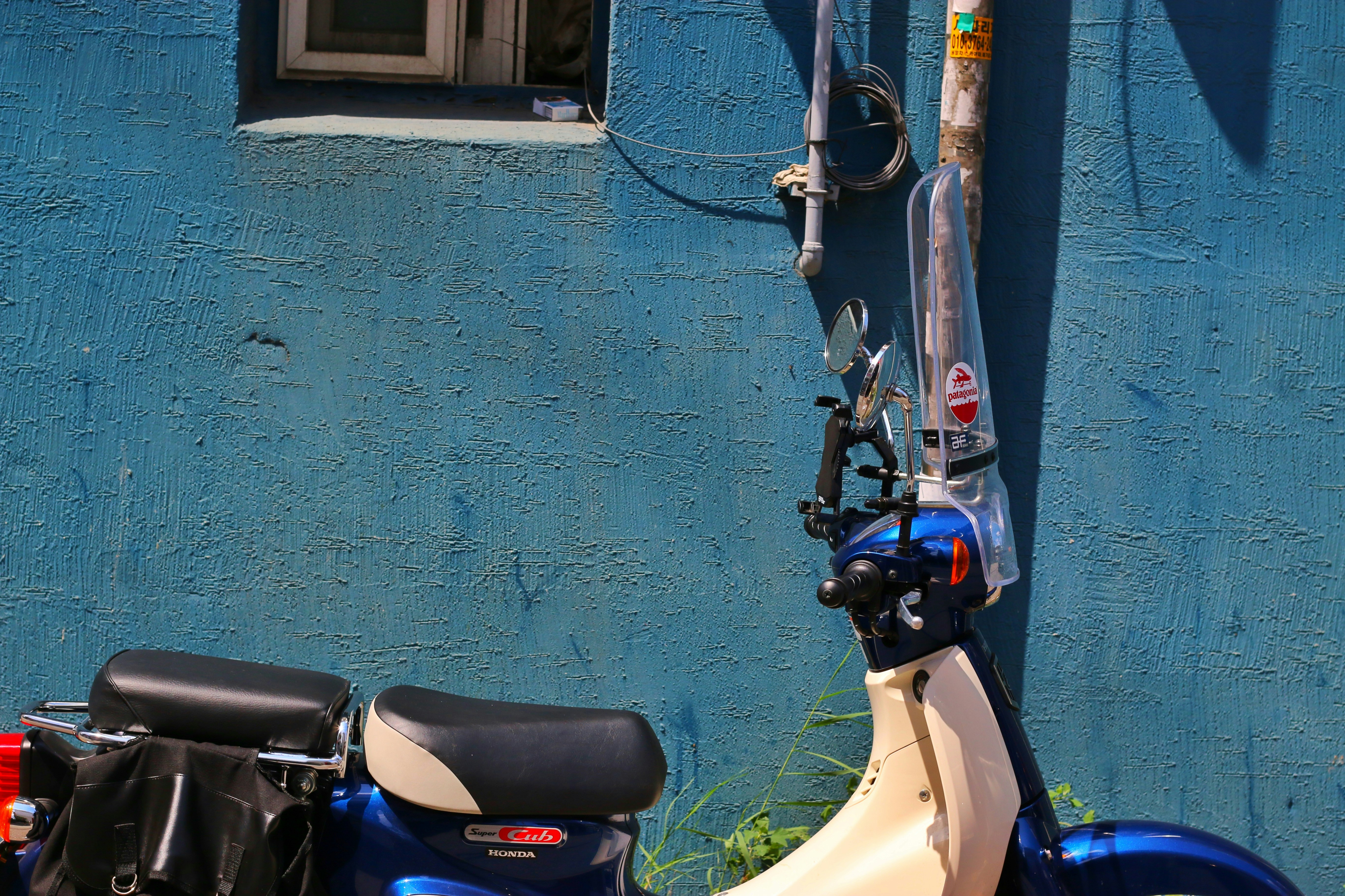 Blue Wall, Scooters, and Alley Details