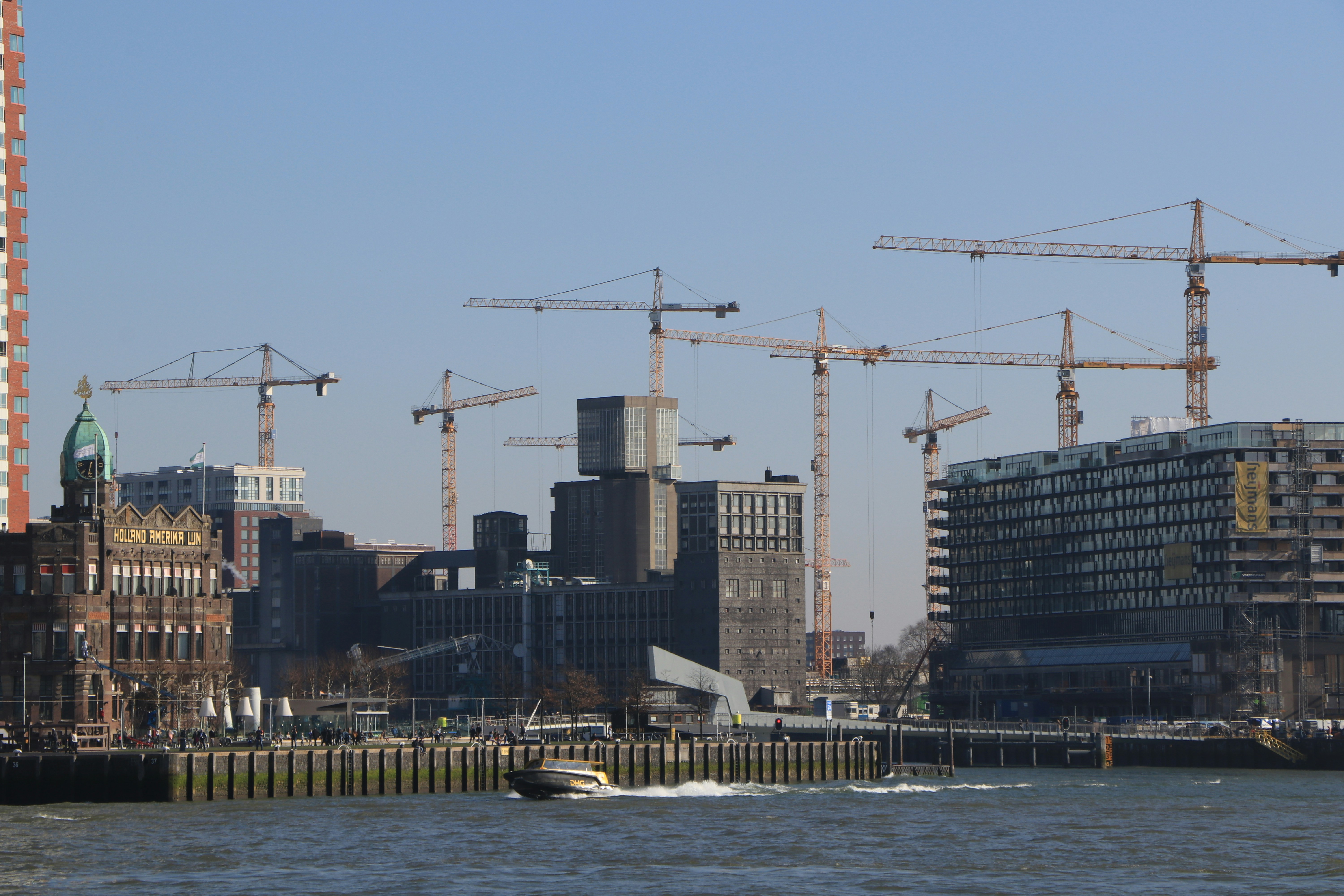 Tower cranes beside buildings during daytime photo – Free Grey Image on ...