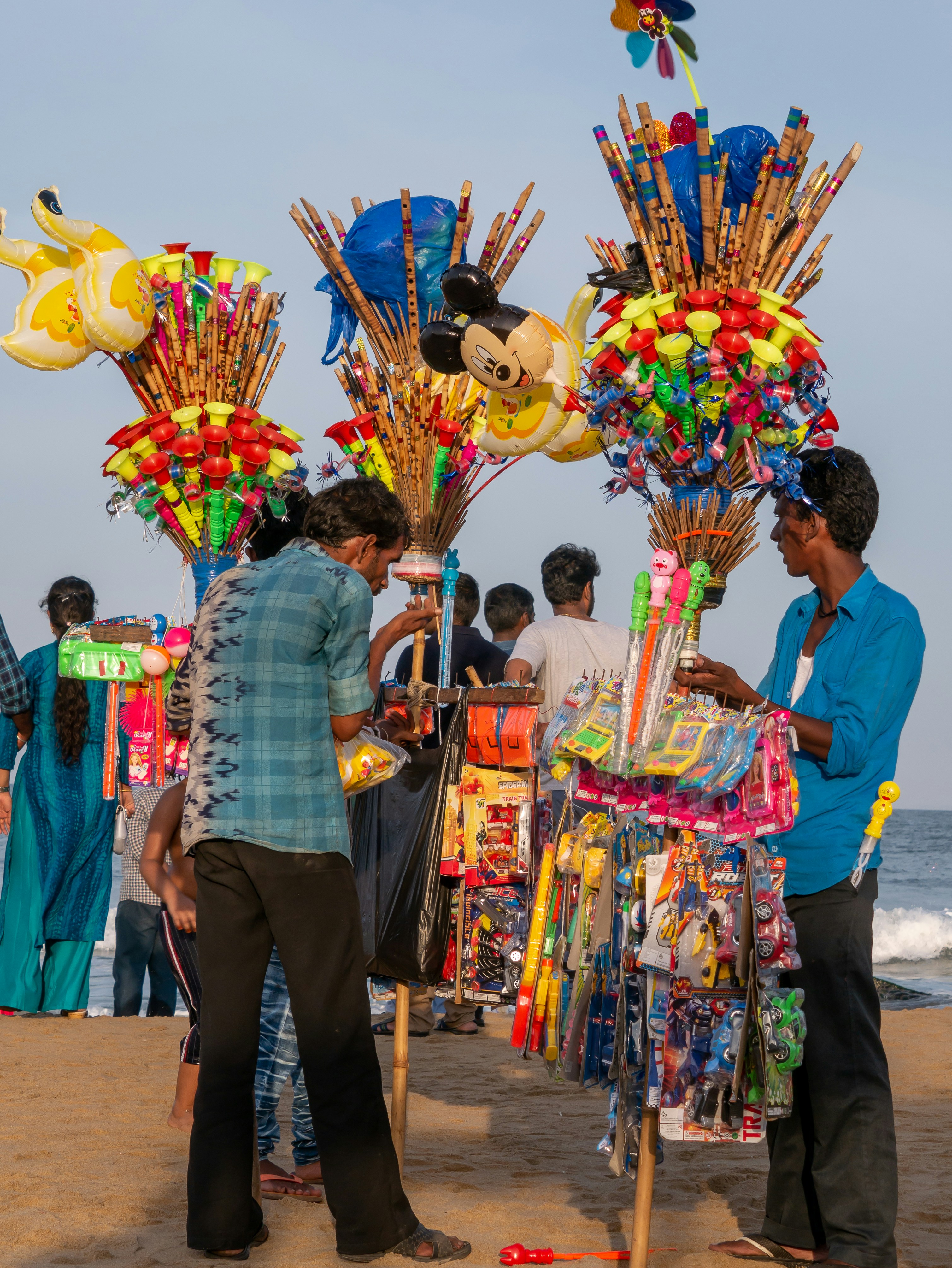 Seafront Balloon Bazaar: Vendors, Toys, and a Carnival of Color by the Shore