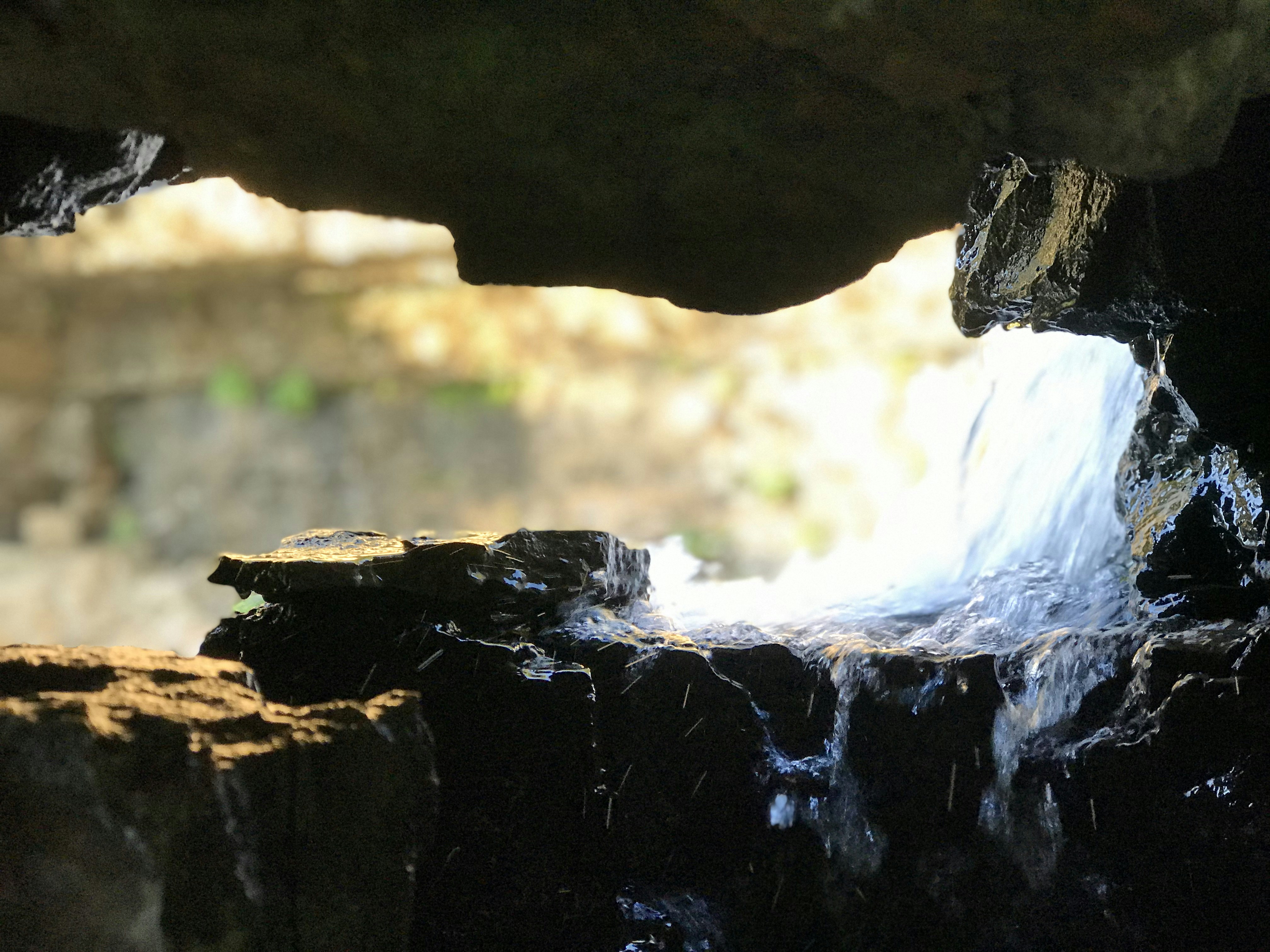 A small waterfall coming out of a cave photo – Free 1086 co rd a Image ...