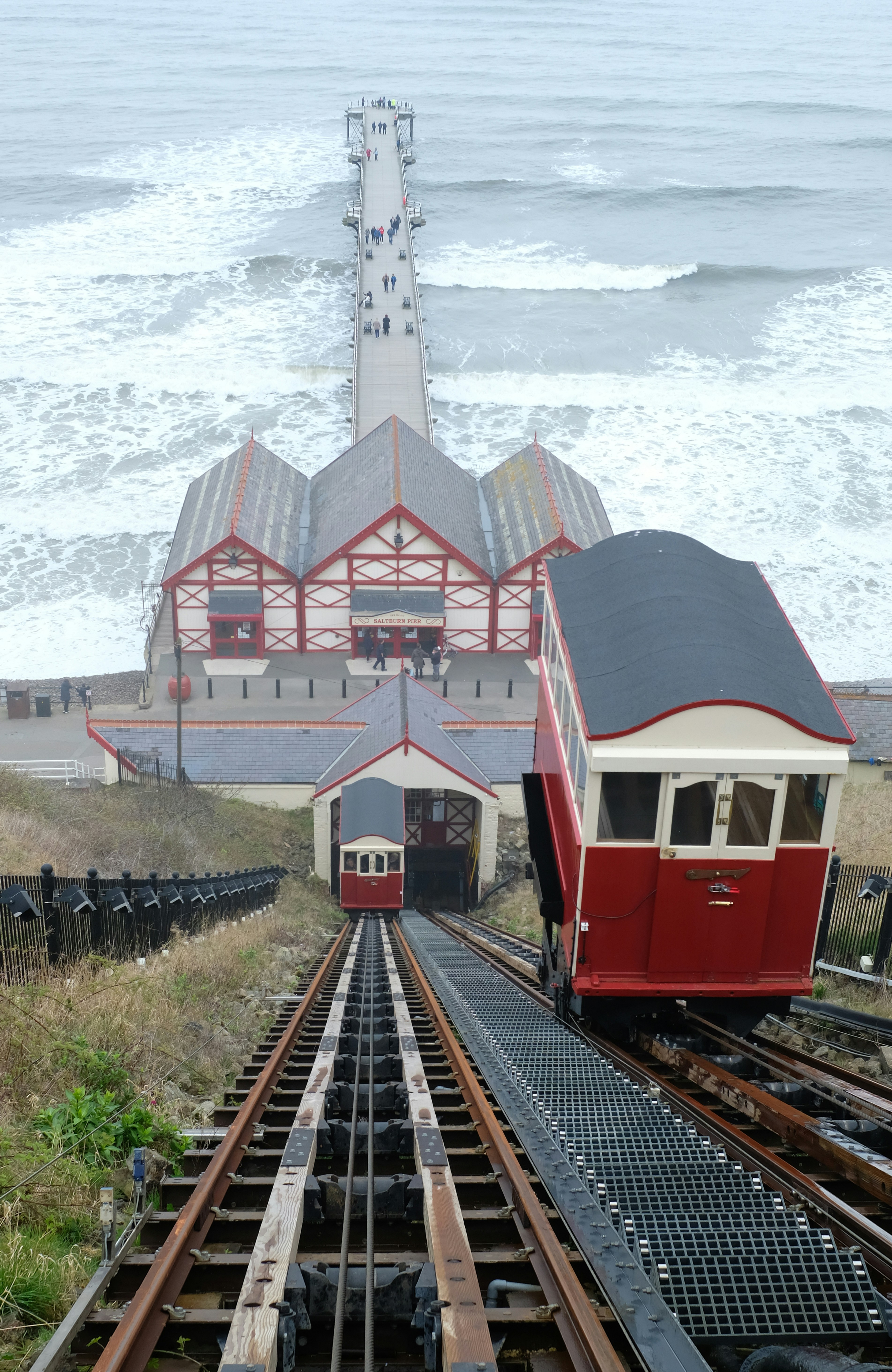 Red Rails to the Sea Pier: A Coastal Ascent