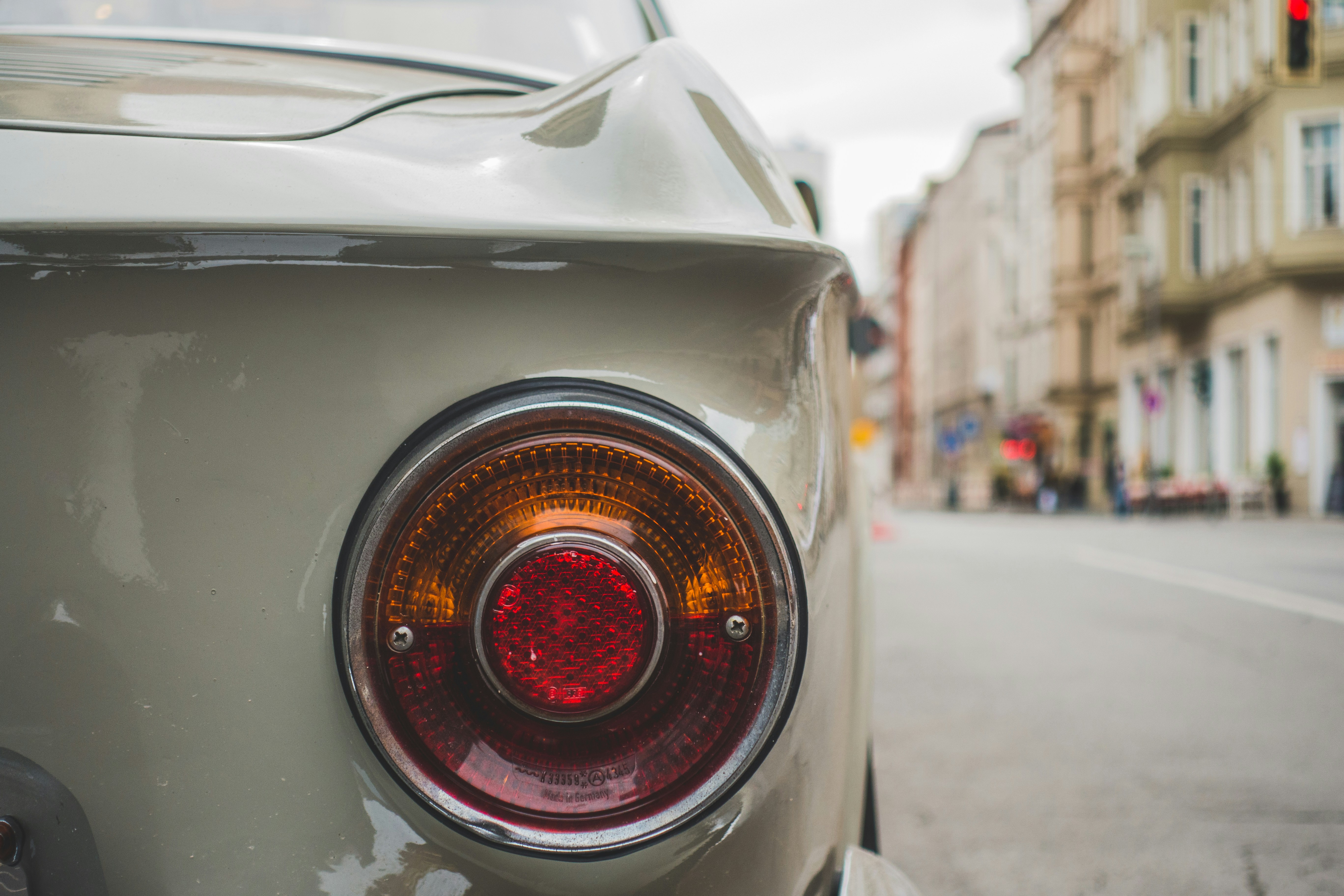 Retro Circle: Tail Light on a Quiet City Street