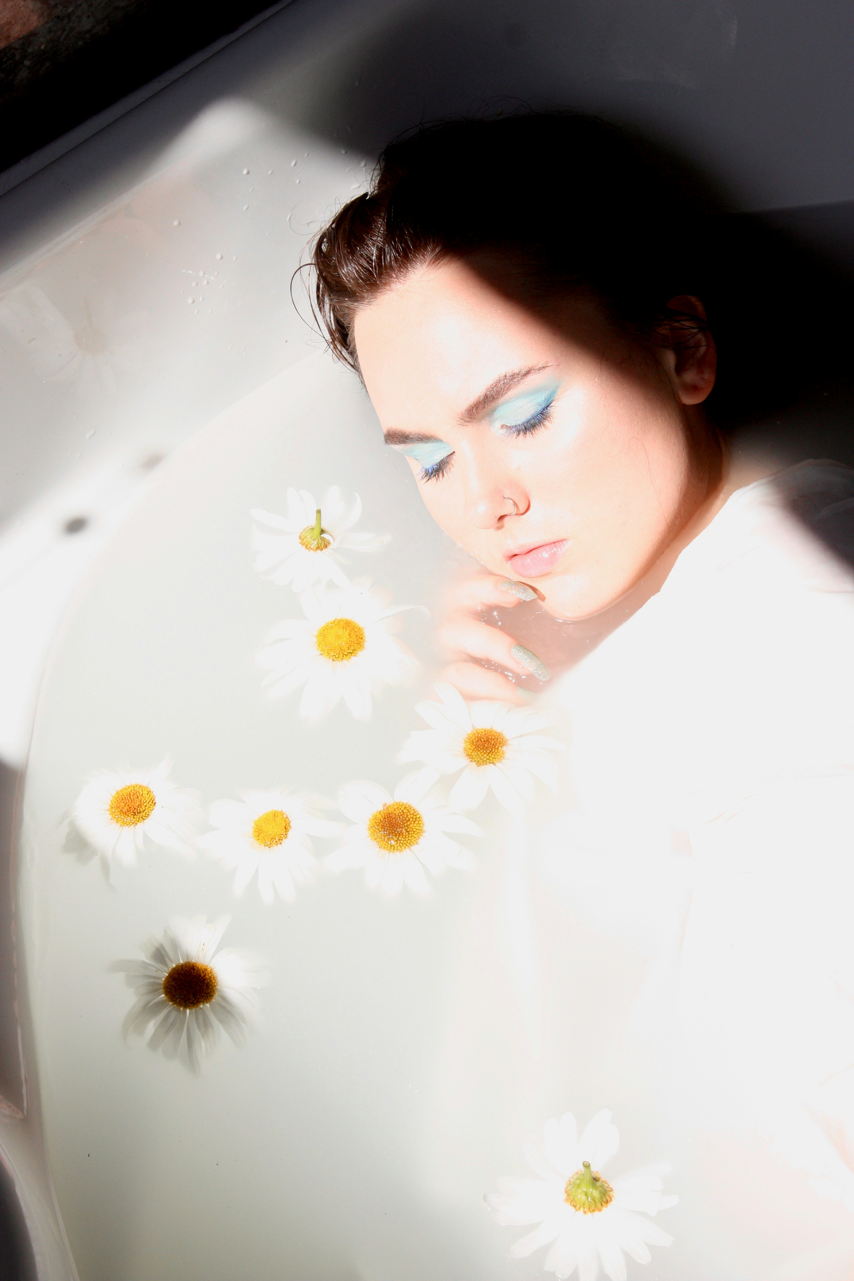 Milky Bath Reverie: Portrait Among Floating Daisies