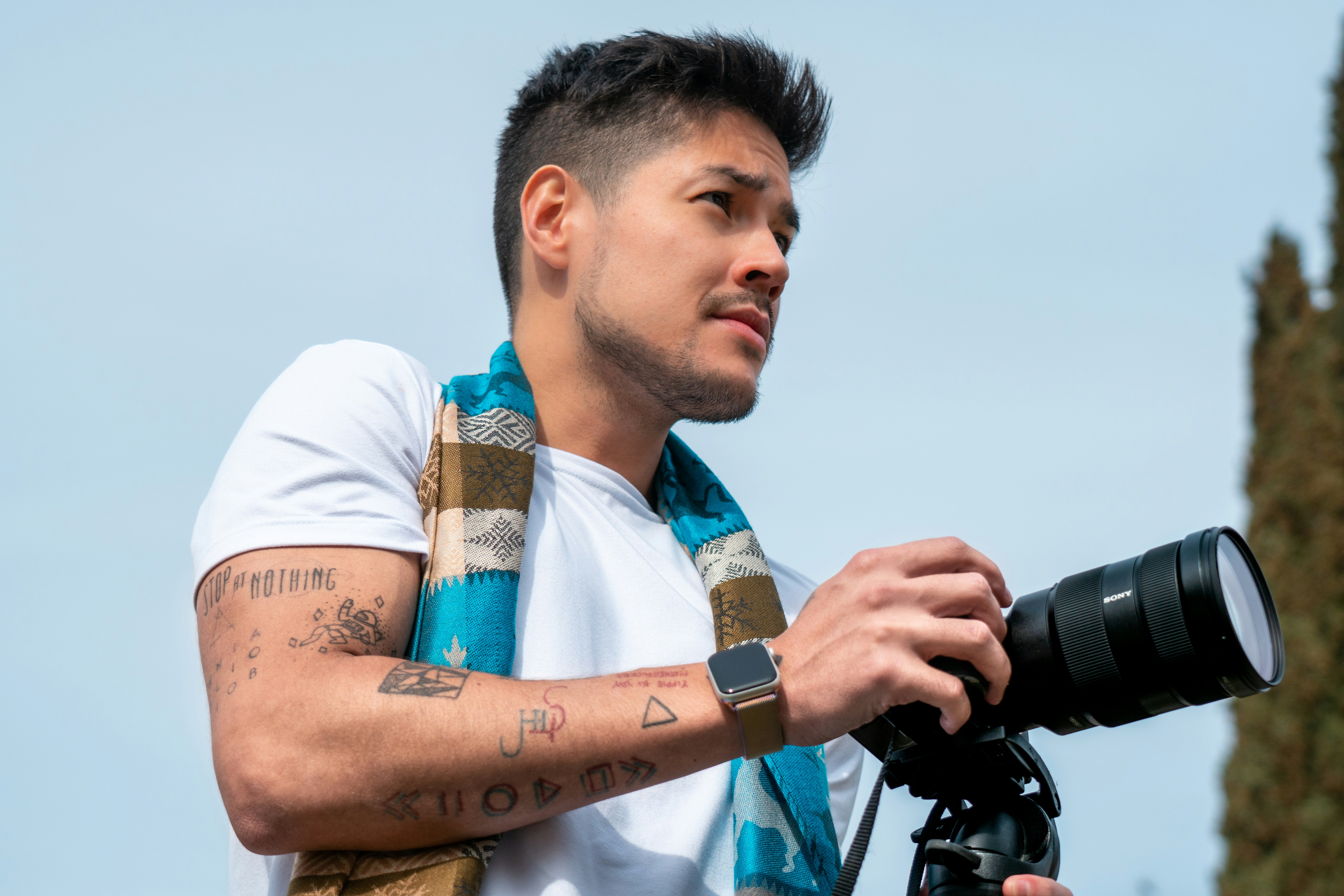 Man using DSLR camera photo – Free Blue Image on Unsplash