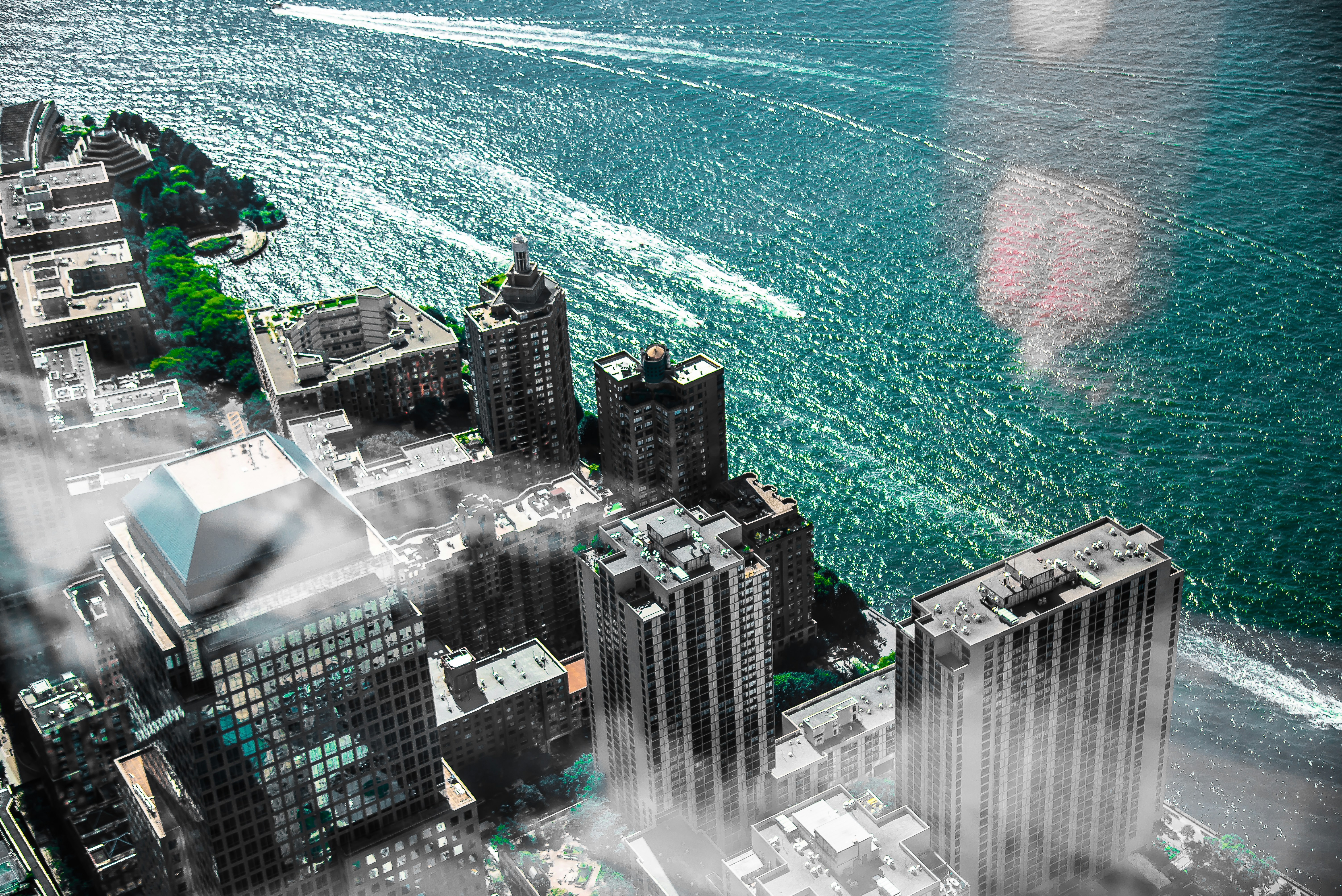 High rise buildings near ocean photo – Free Nature Image on Unsplash