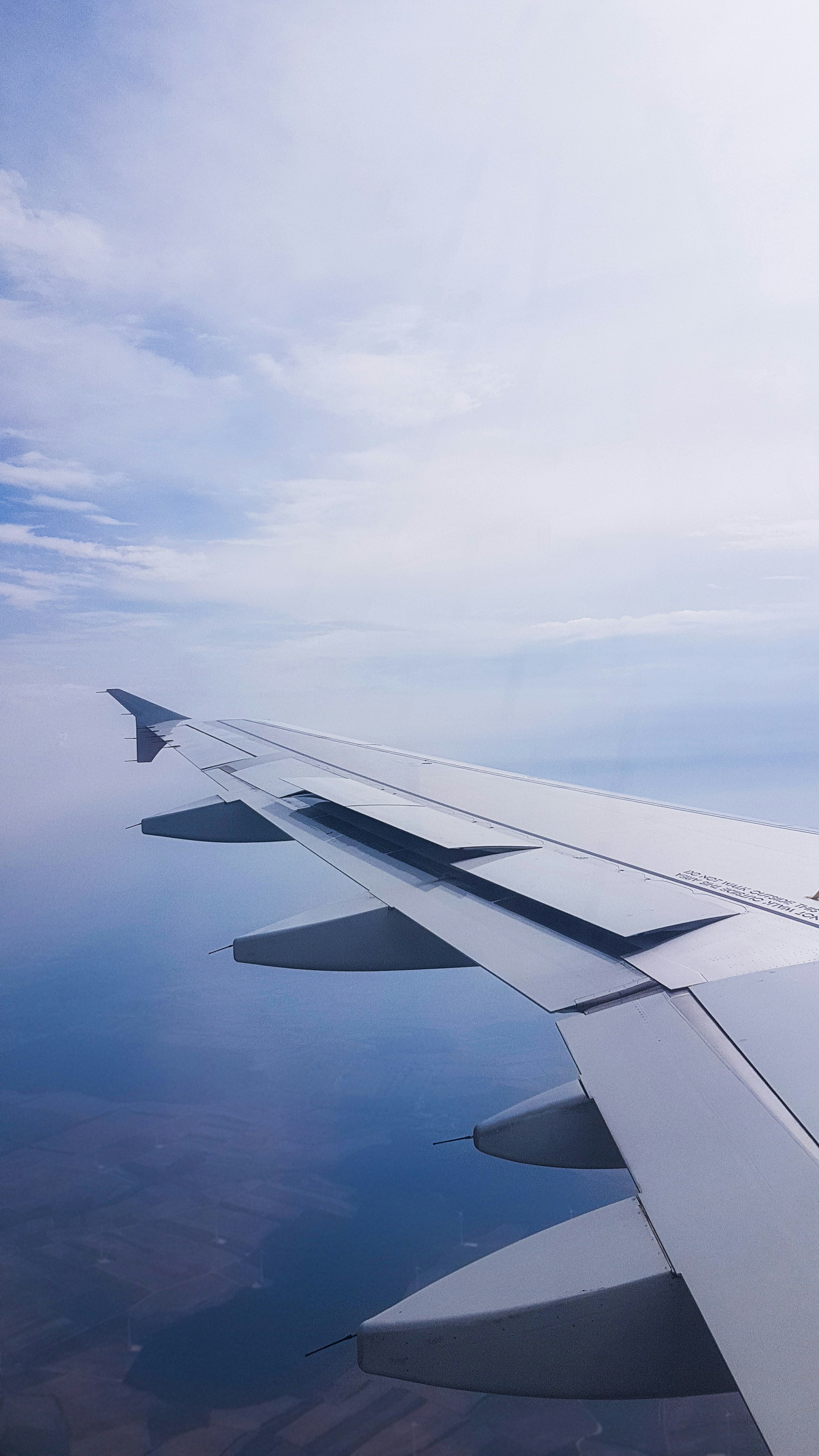 Gray plane wing photo – Free Austria Image on Unsplash