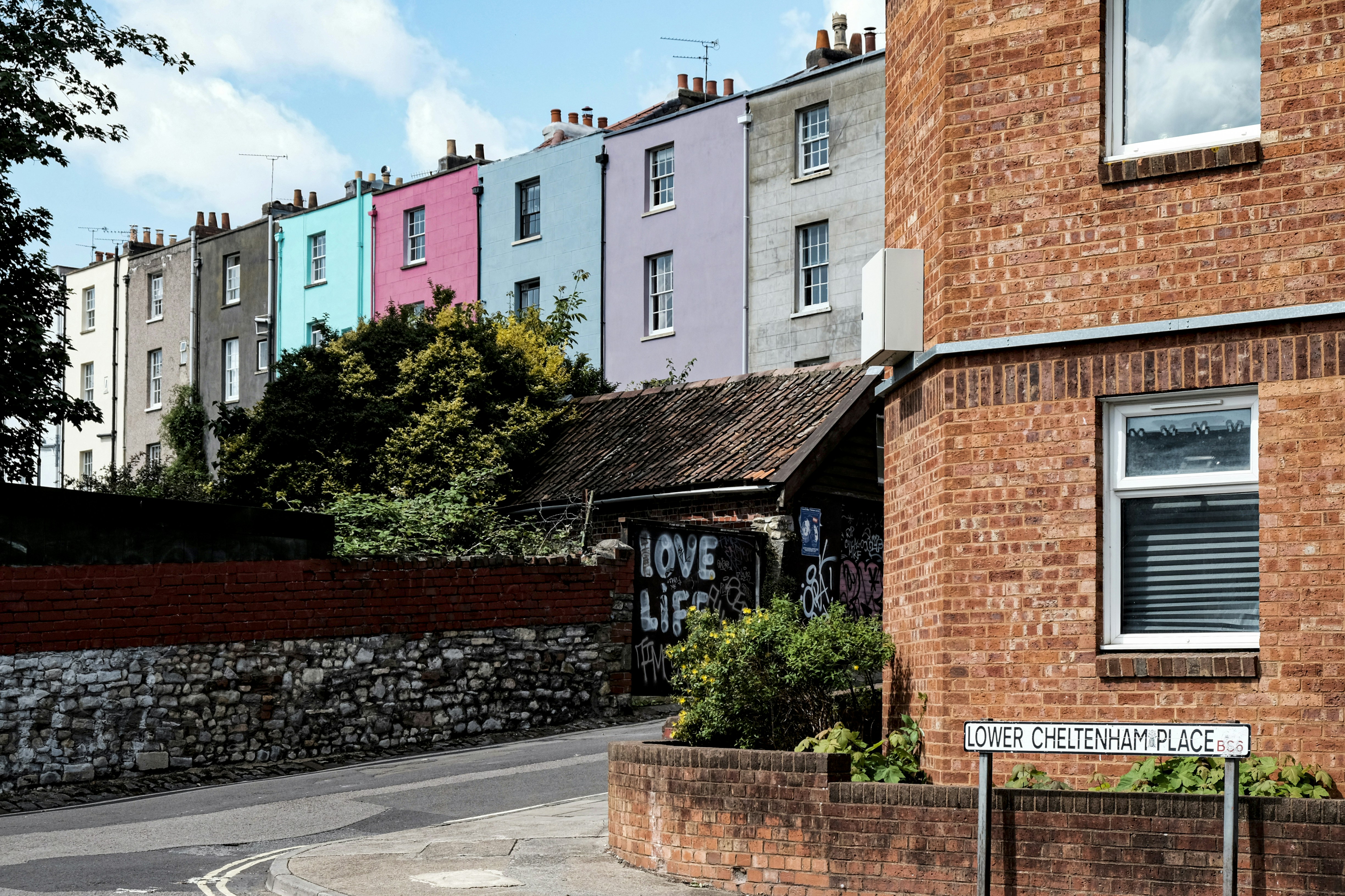 gray and pink concrete high-rise building