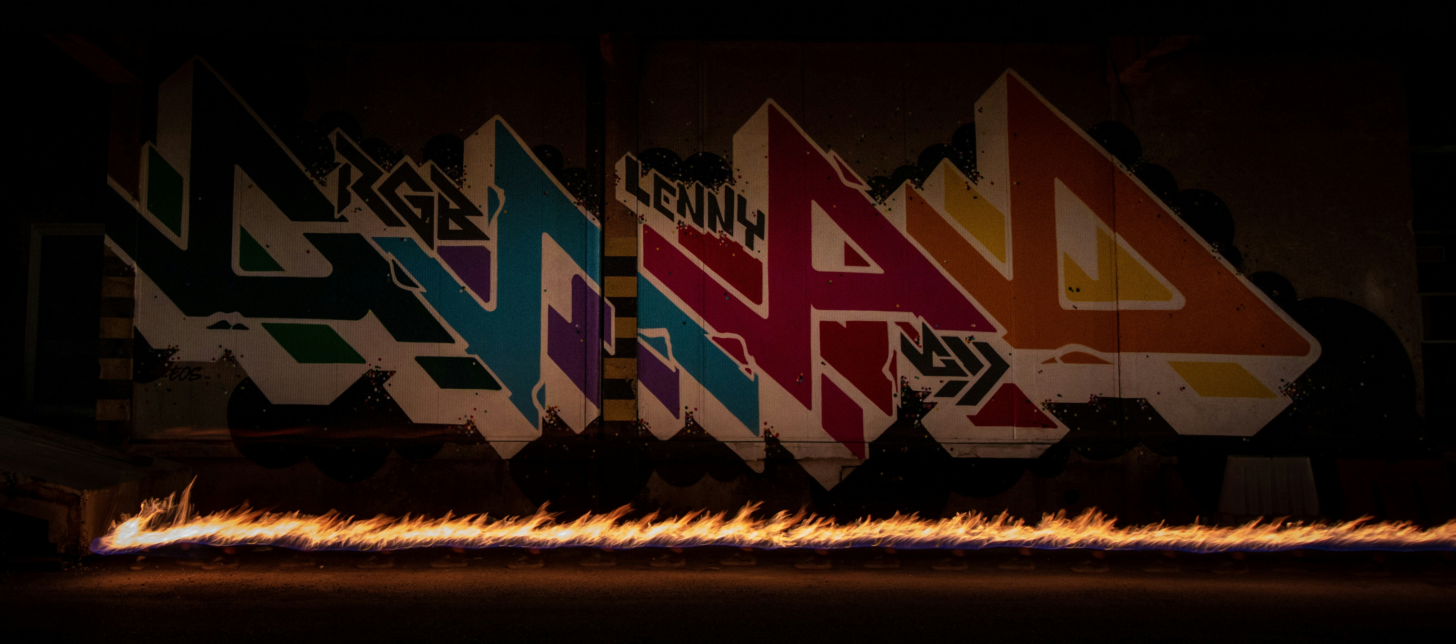 Flame-runner Under Neon Graffiti