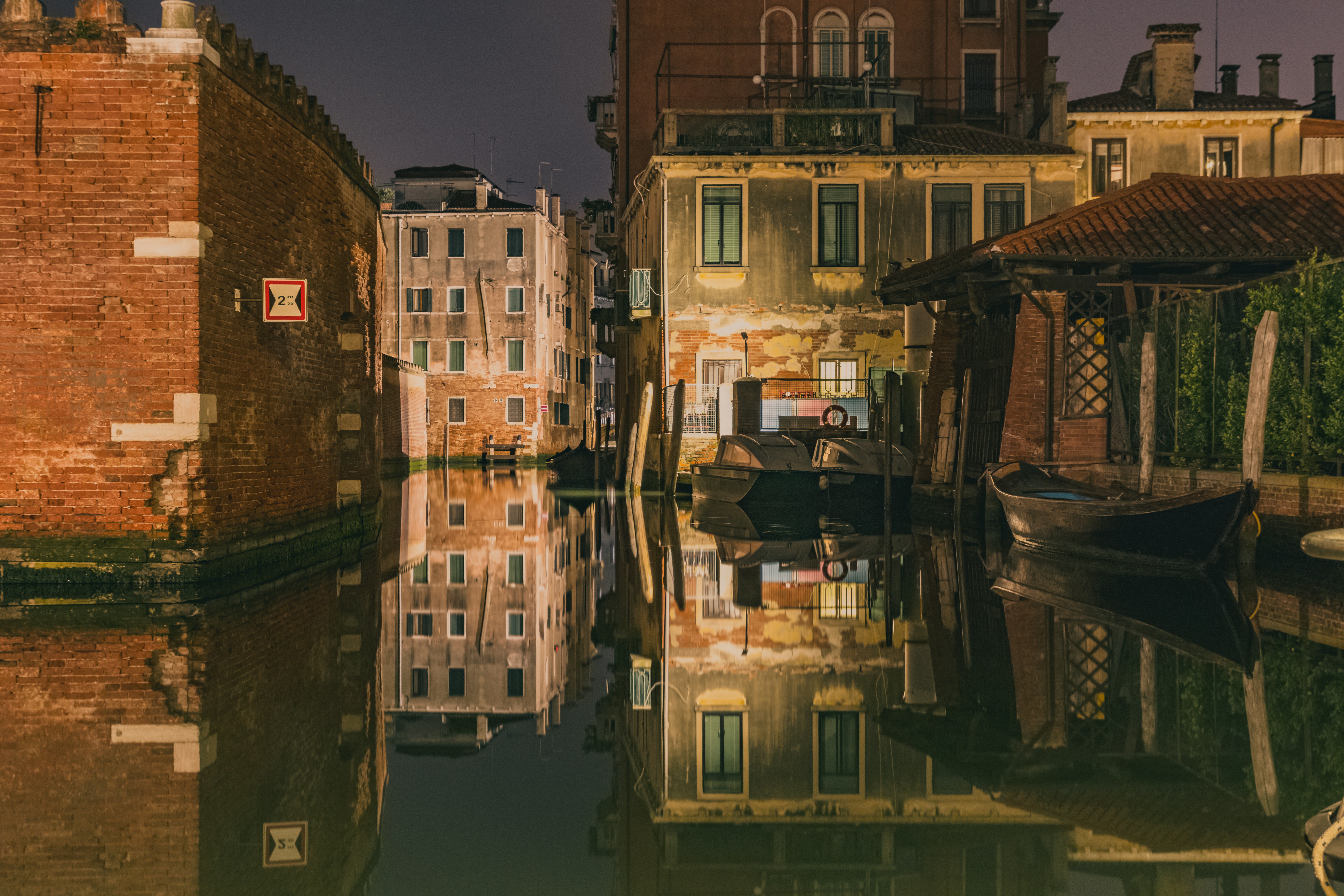 Midnight Facades Reflected: A Venetian Canal in Still Warmth