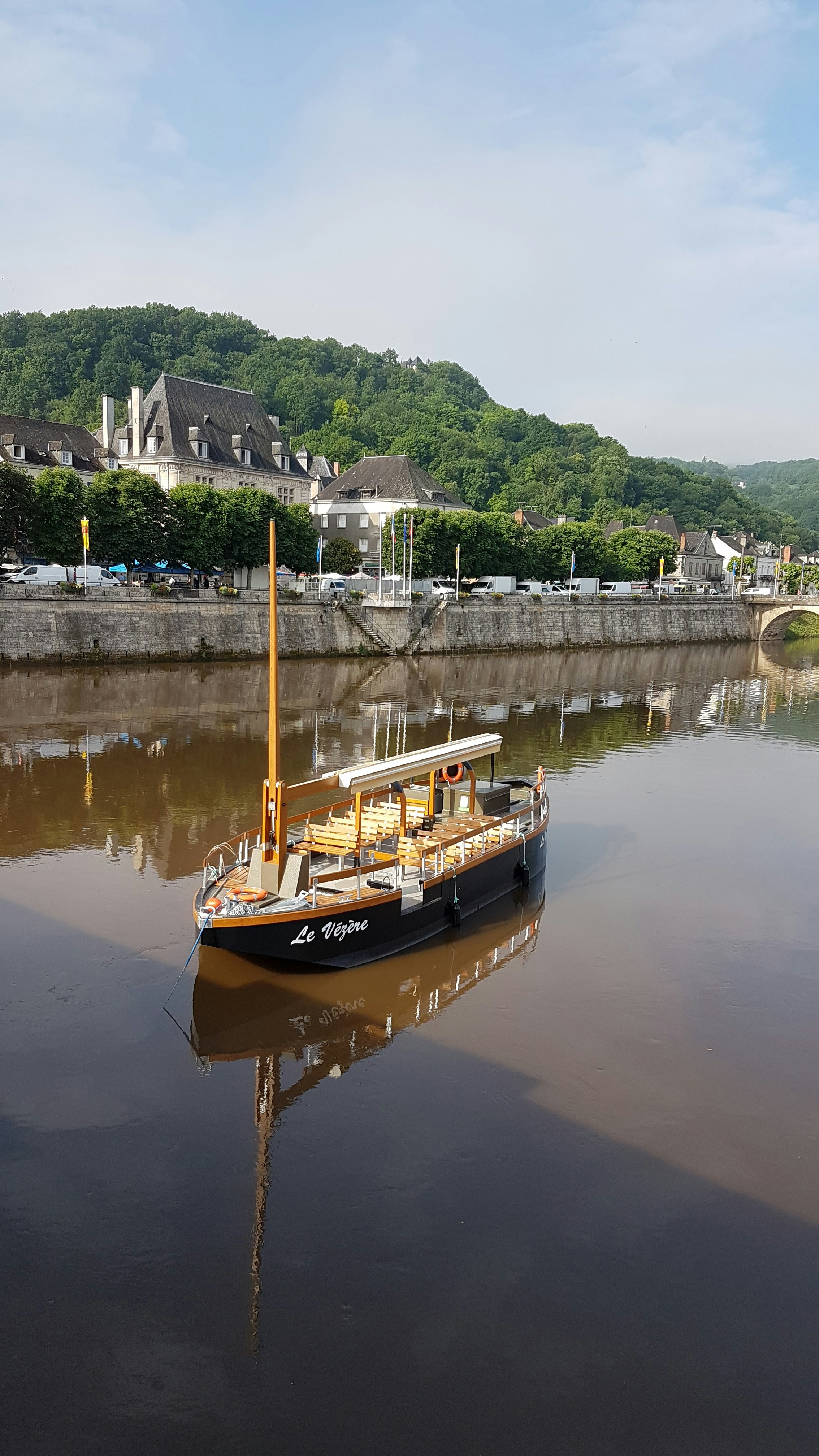 Le Vigne Anchored on a Mirror-Still Riverfront