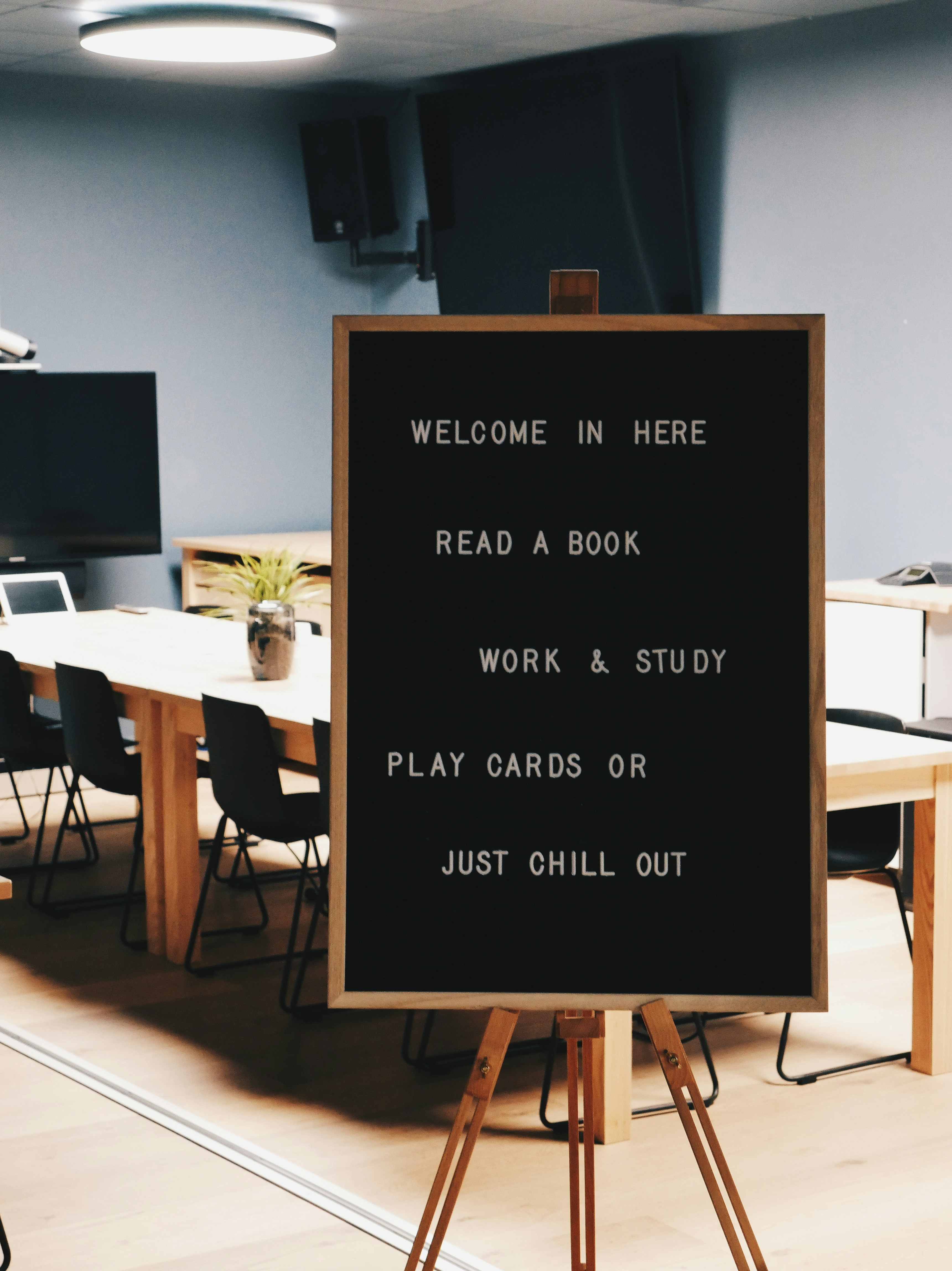 Signboard in a Quiet Library Corner invites Study and Calm