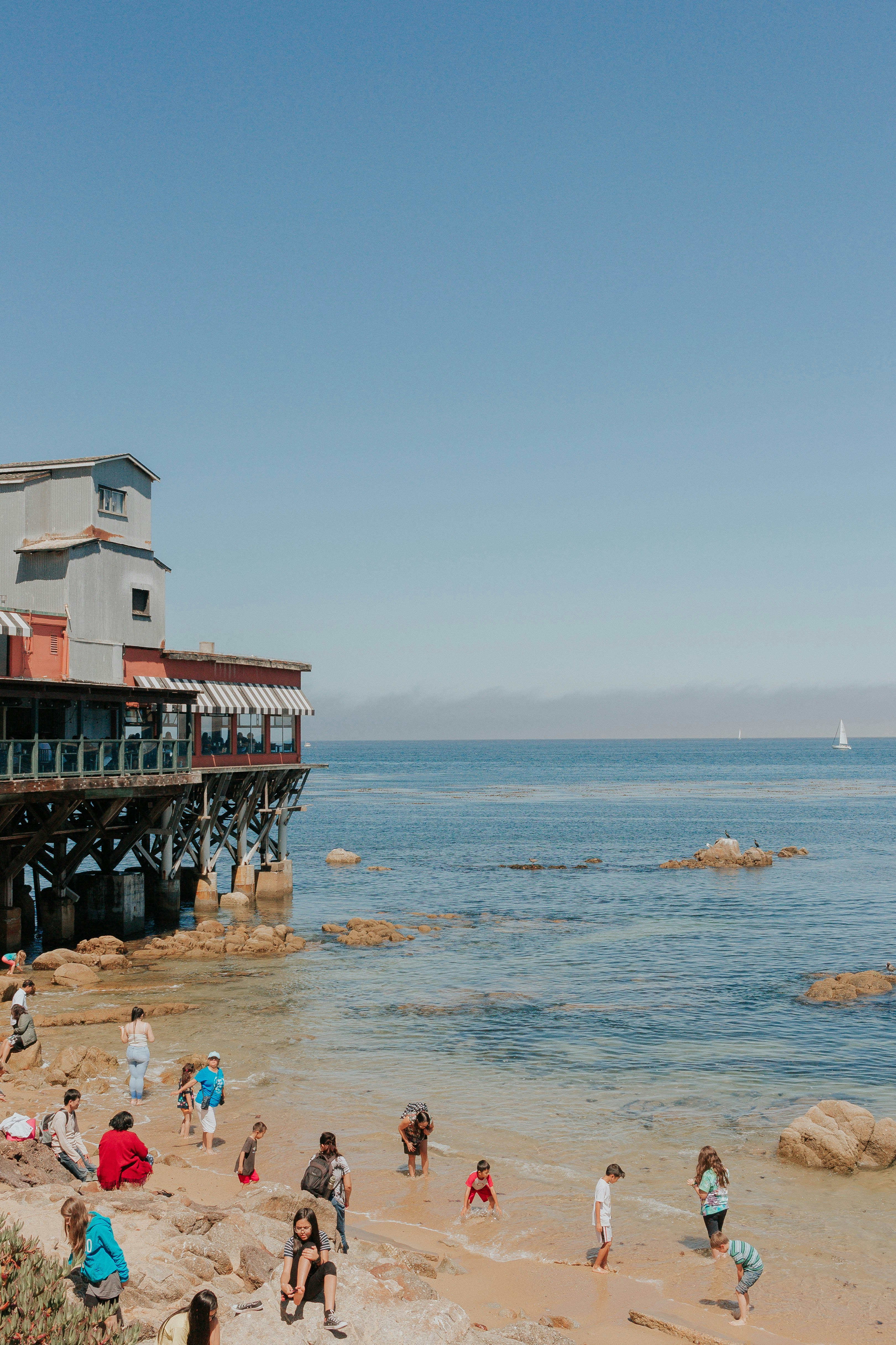 Pierfront Café and Calm Seas: A Sunlit Coastal Morning