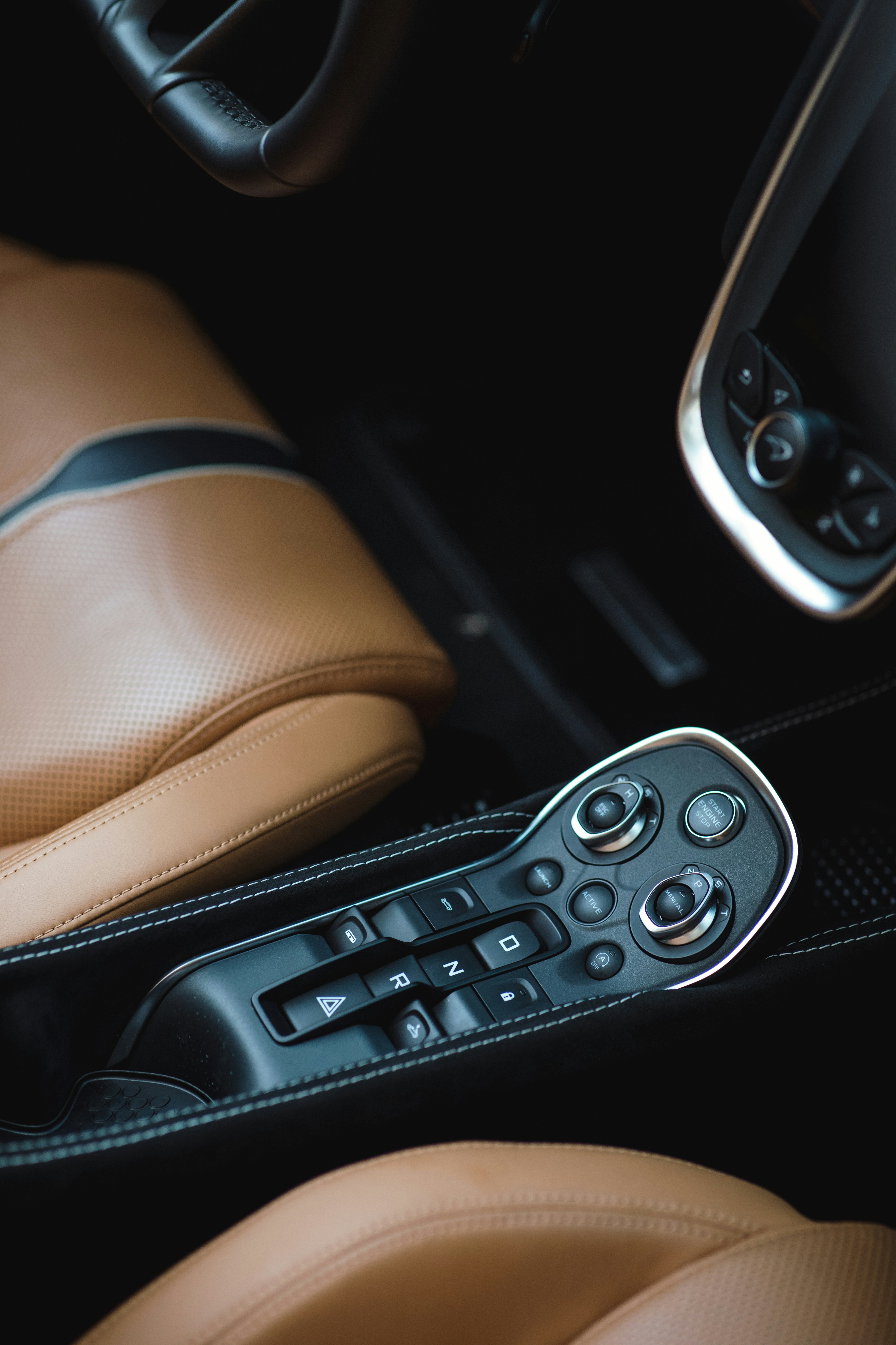 Tan Leather Cockpit: Precision Knobs and Silvery Trim