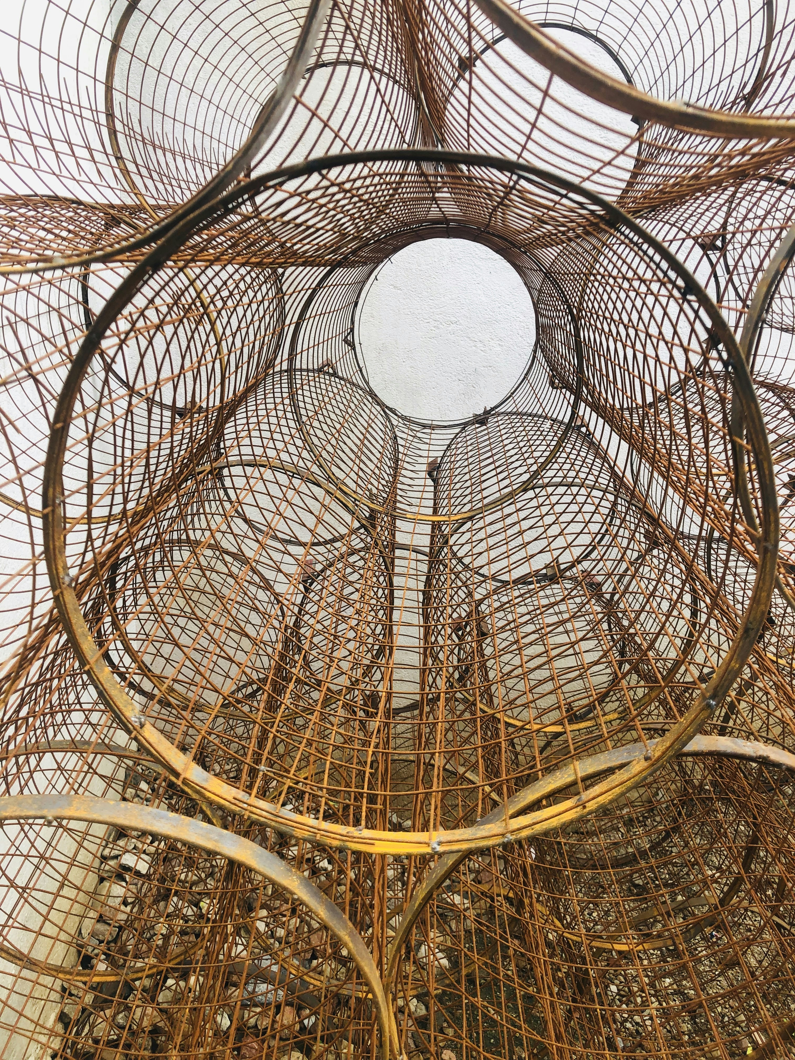 Rusty Circles Ascend: a vertical lattice reaching toward the sky
