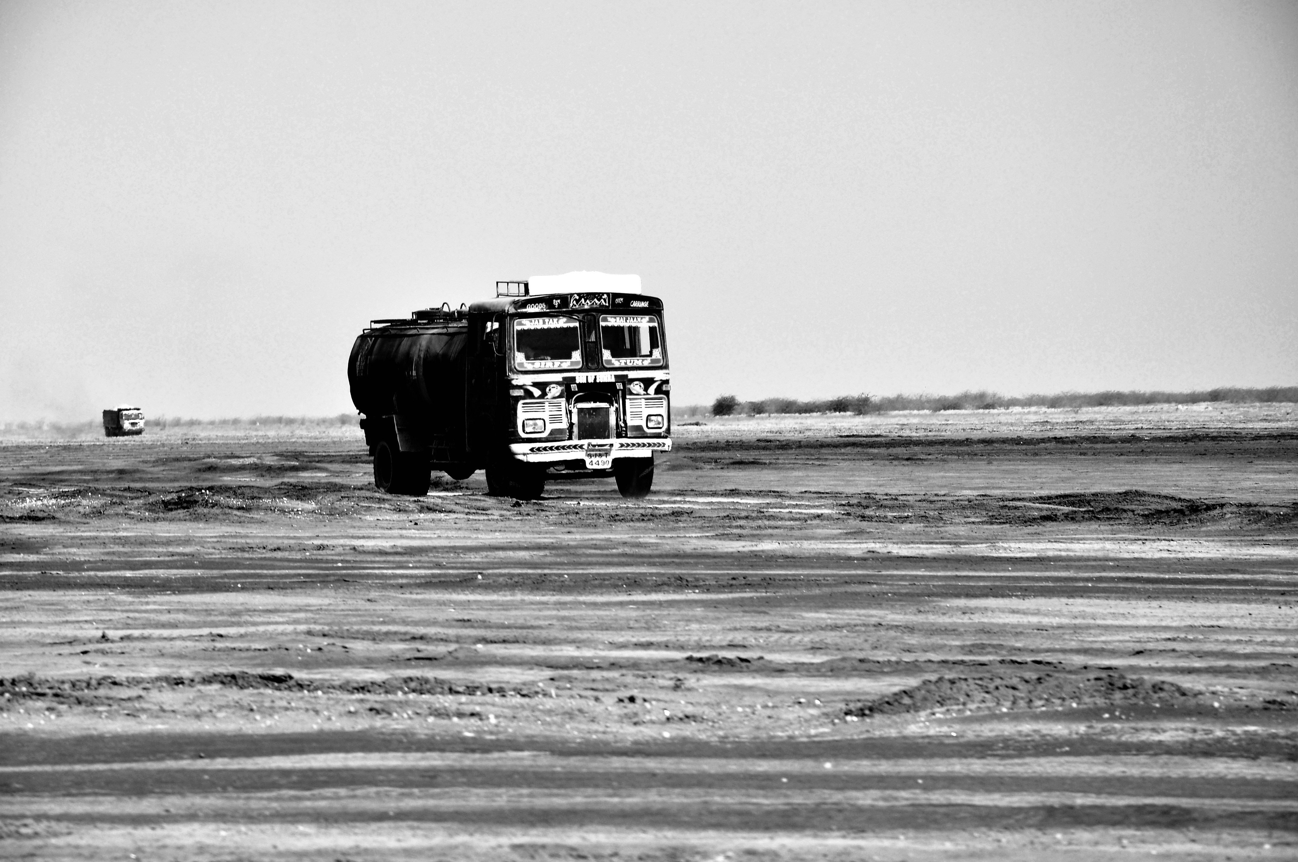 Dust and Steel: A Lone Tanker Across a Desolate Plain