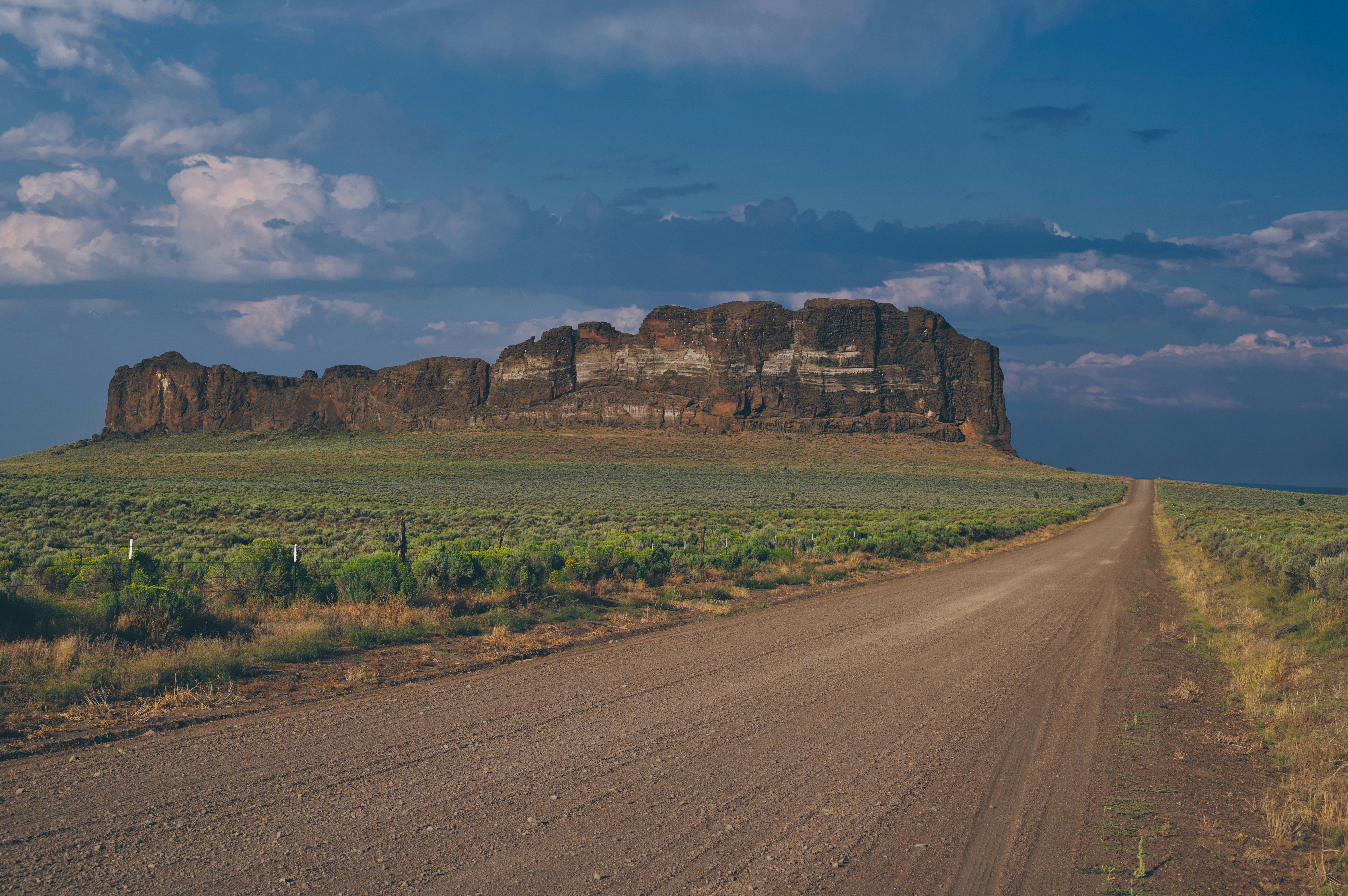 Dust Road to the Desert Mesa: A Quiet Reach Toward a Layered Sentinel