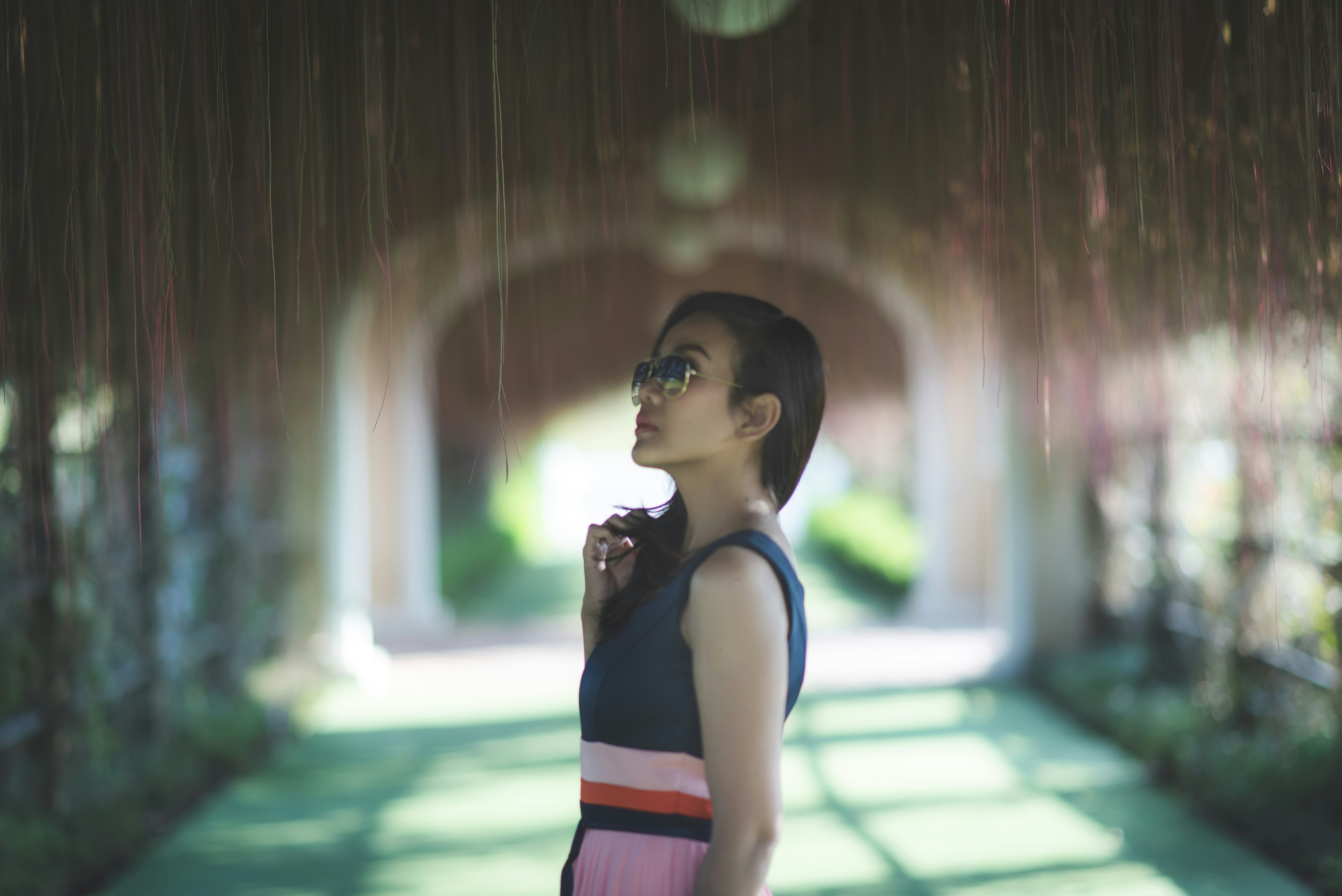 Woman standing inside hallway photo – Free Human Image on Unsplash