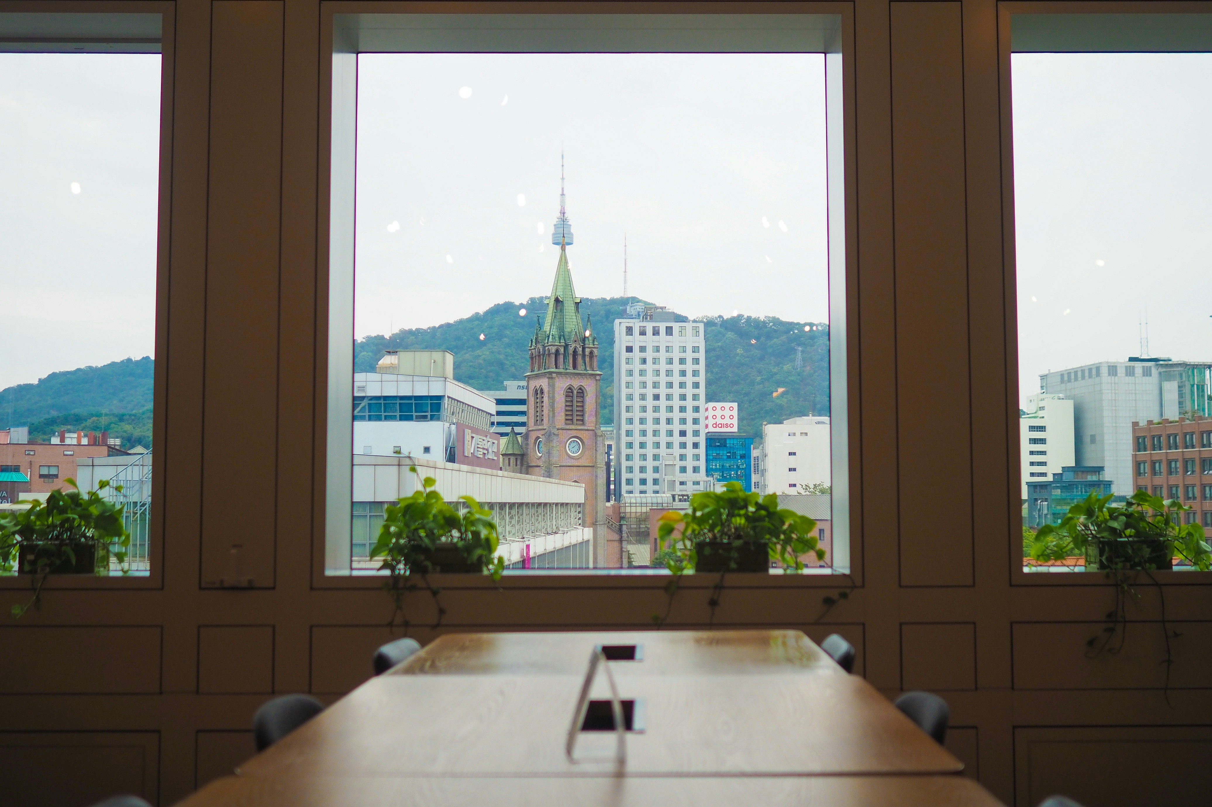 Cityscape through a Quiet Office Window